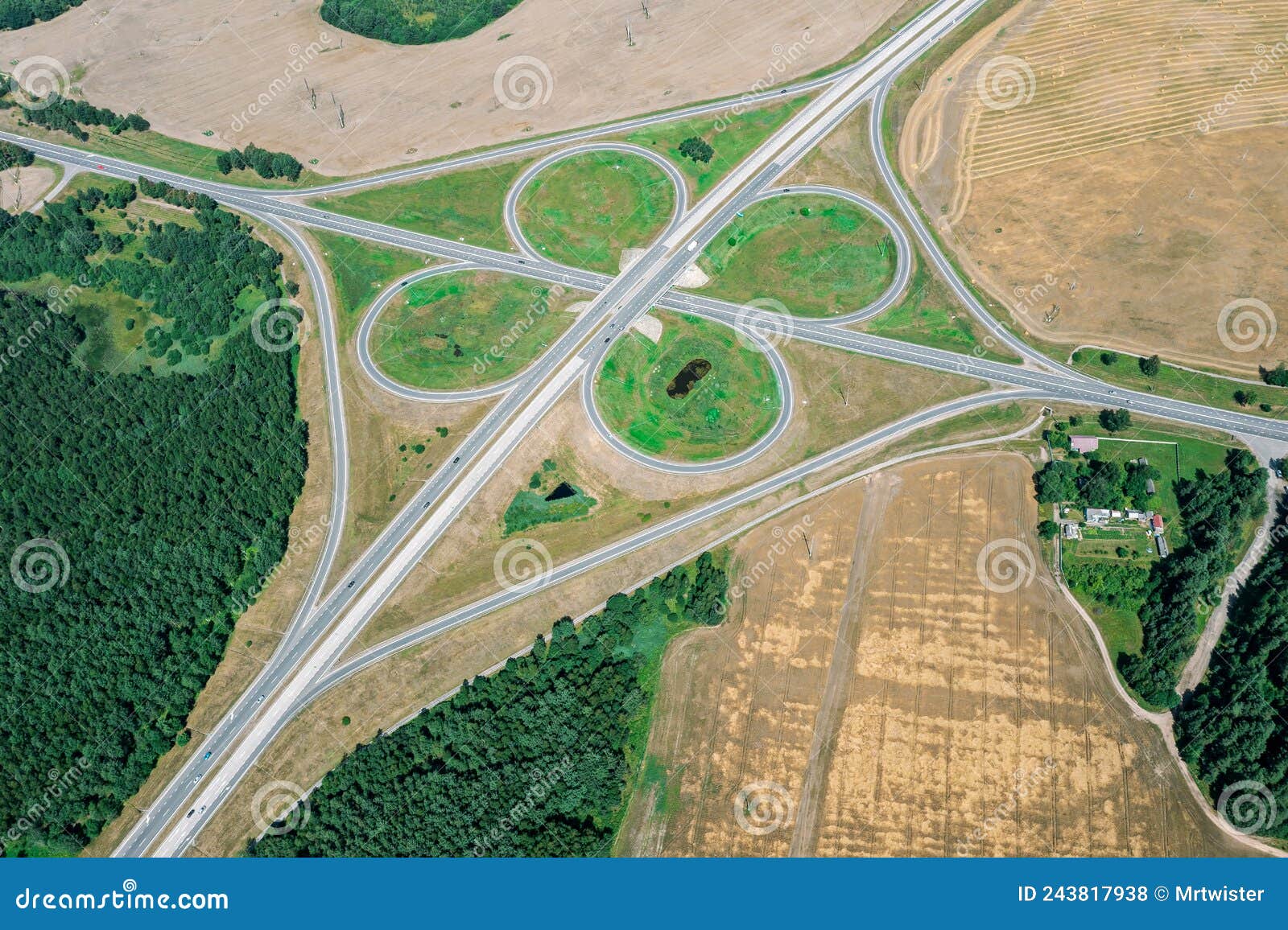 Aerial View of a Highway Intersection with a Clover-leaf Interchange in ...