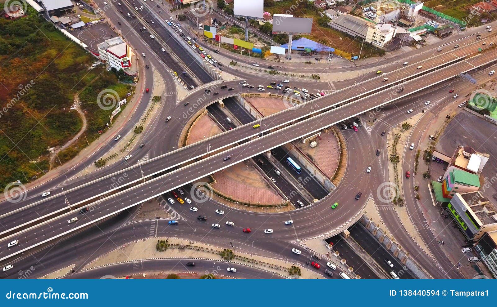 Aerial View of Highway Junctions with Roundabout. Bridge Roads Shape ...