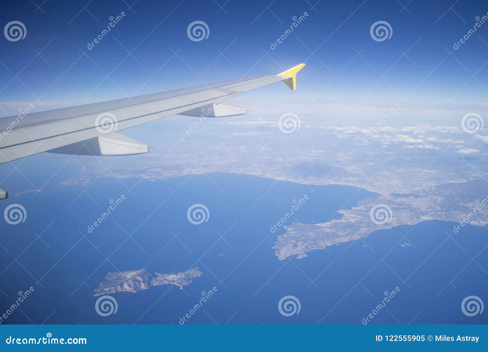 Aerial View of Italian Coastline with Wing of Plane in Flight Stock ...