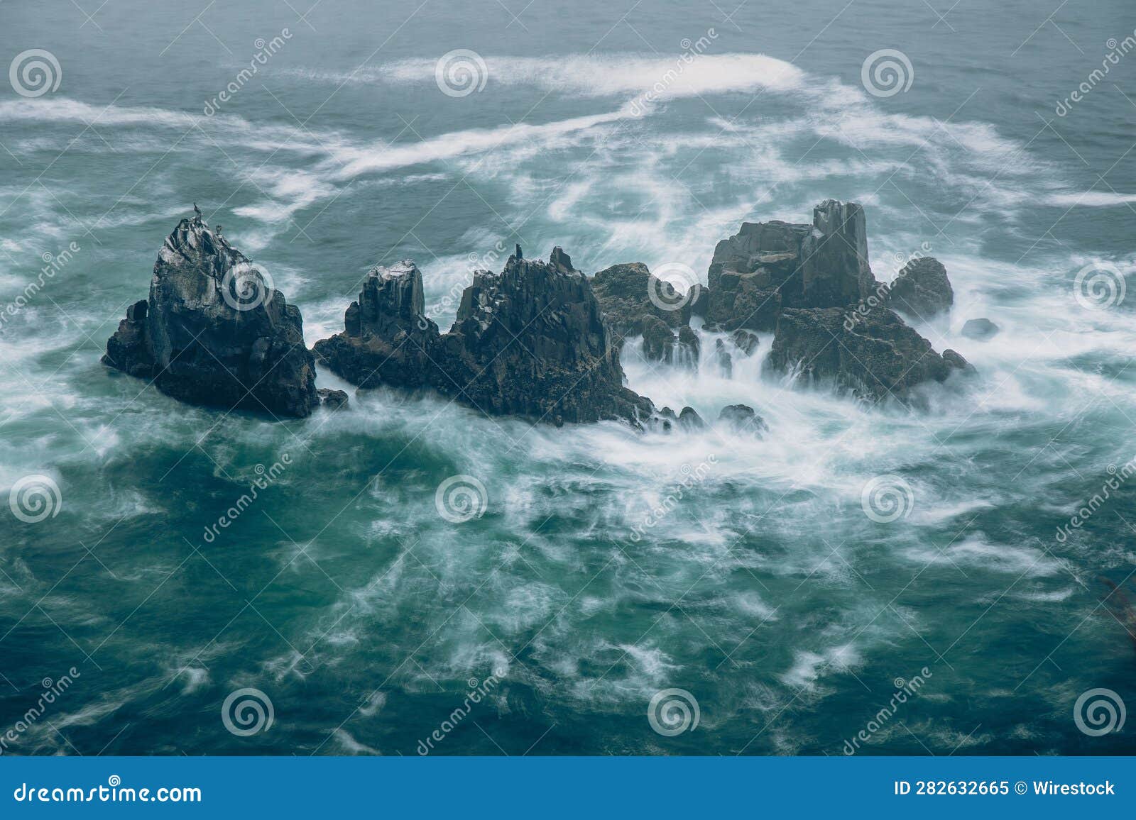 Aerial View of Jagged Rock Formations on Splashing Water in Oregon ...