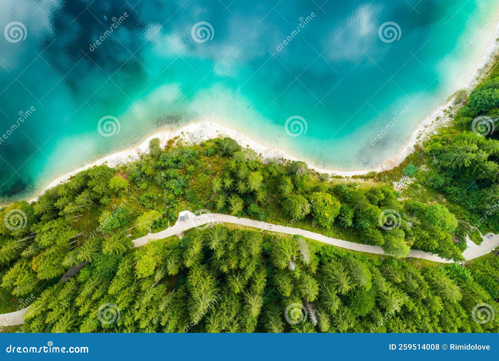 Aerial View of a Lake with Turquoise Water and Clouds Reflection and ...