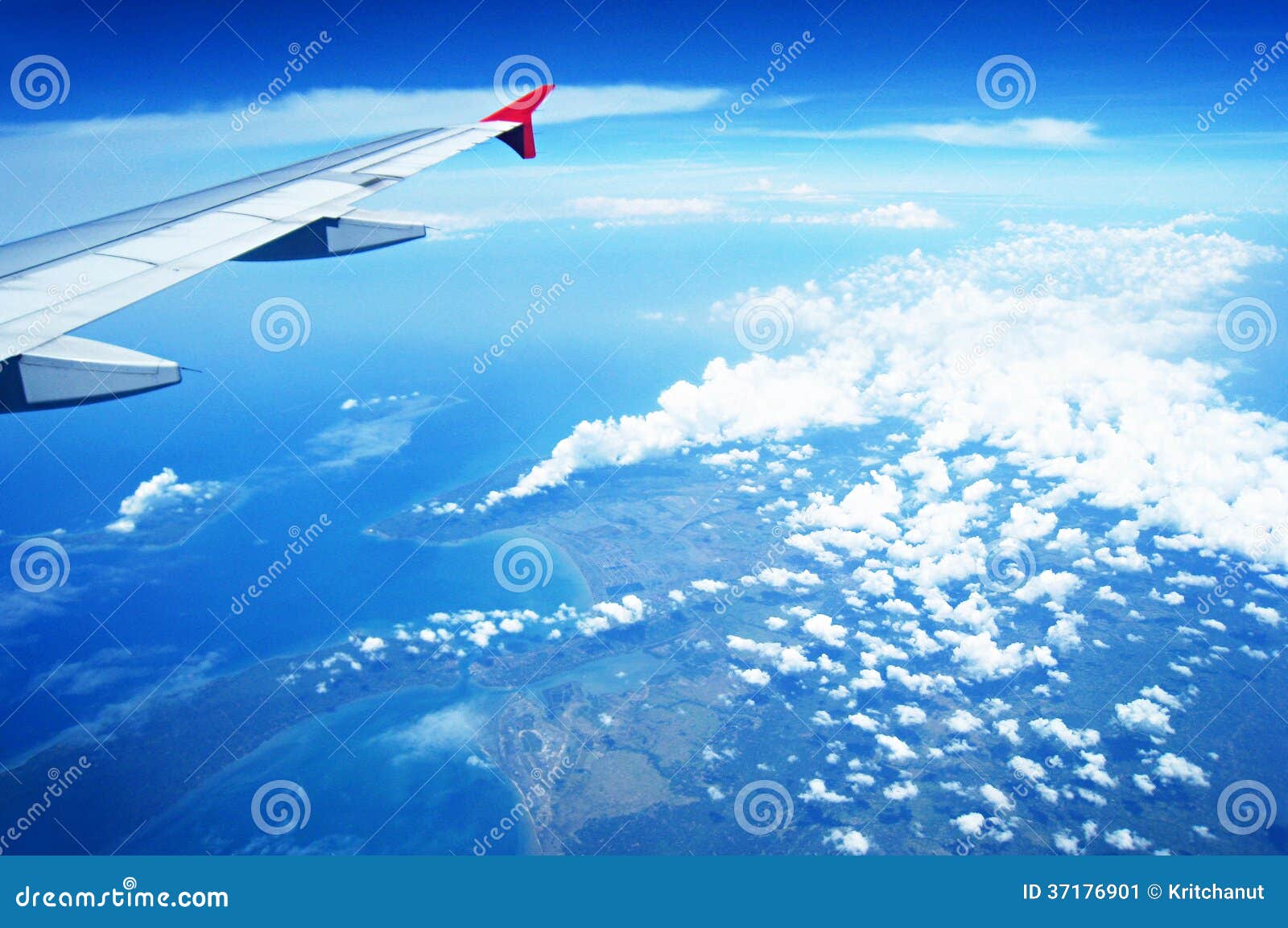 Aerial View of Land and the Ocean from Airplane Stock Image - Image of ...
