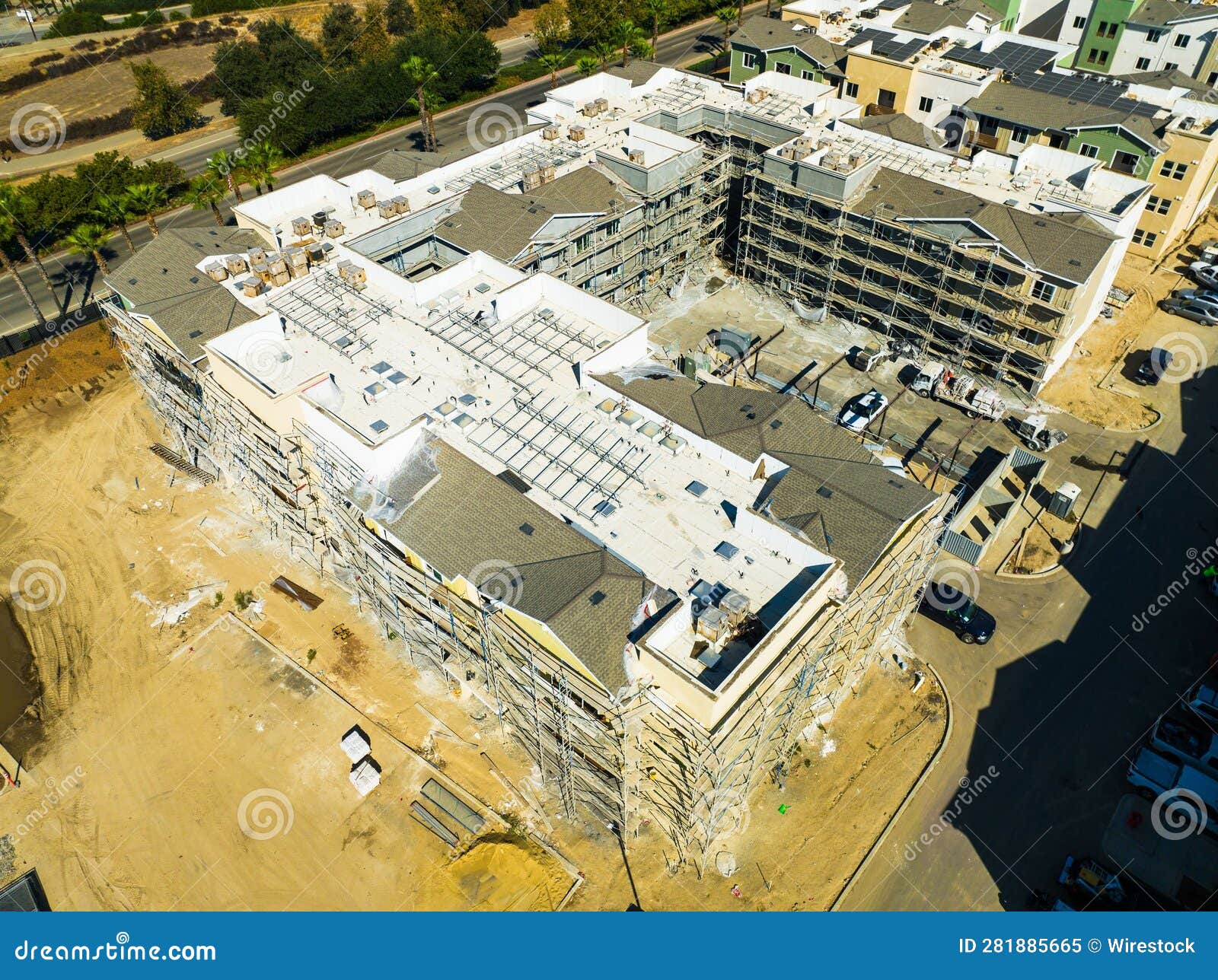 An Aerial View of a Large Building in Construction Works with Several ...