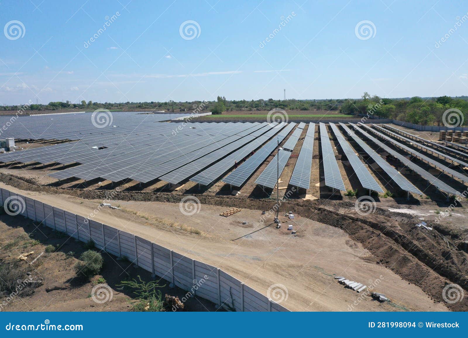 Aerial View of a Large-scale Solar Farm with an Array of Black Solar ...