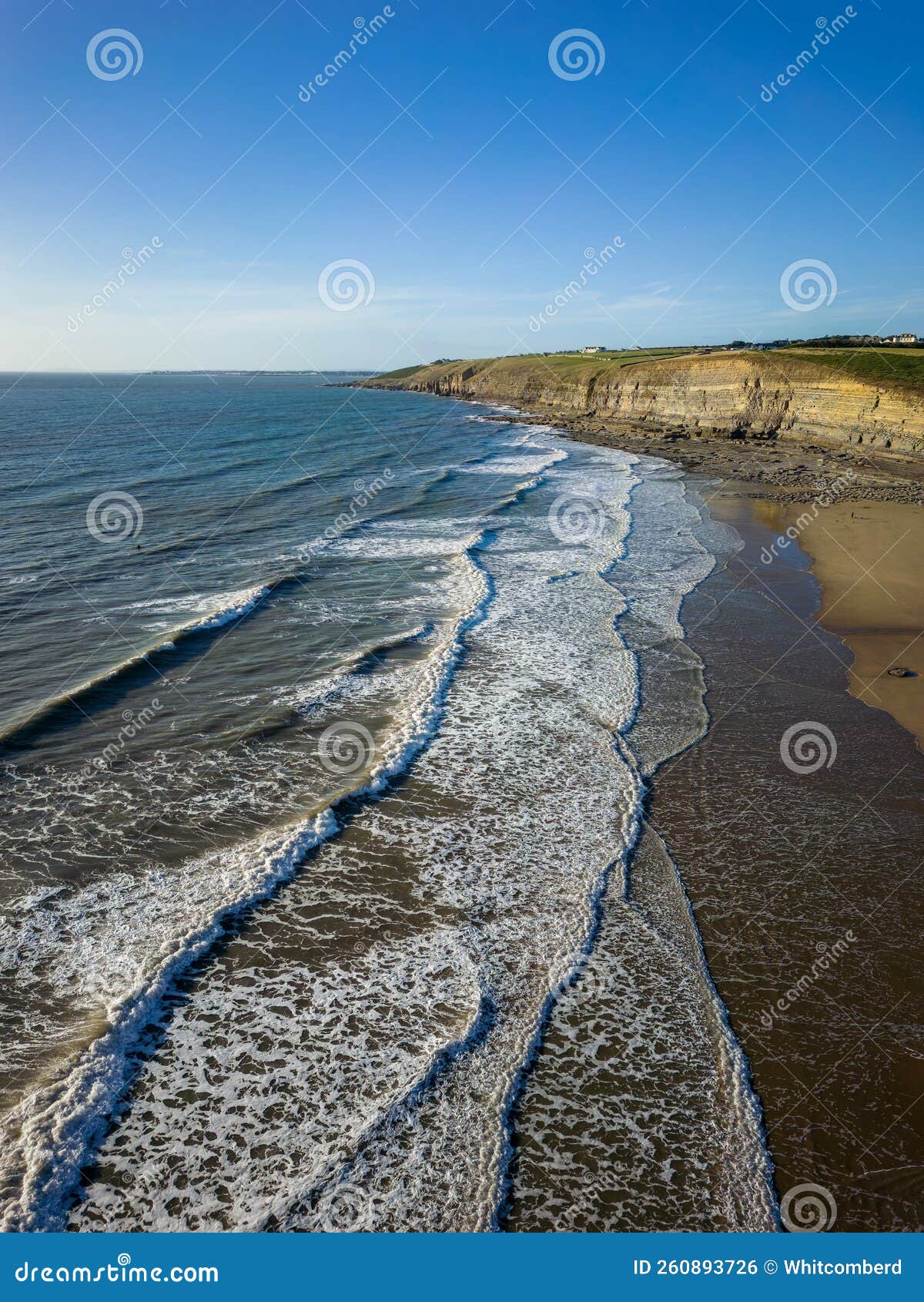 Aerial View of Limestone Cliffs and a Rock Covered Sandy Beach Stock ...