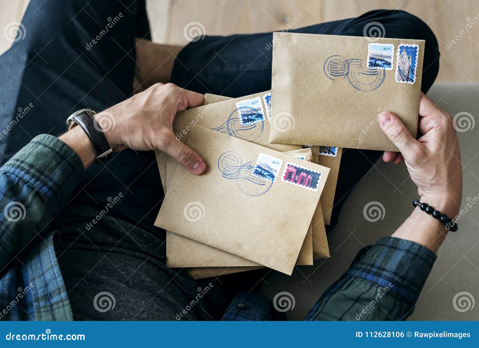 Aerial View of a Man Sorting an Envelope Stock Photo - Image of ...