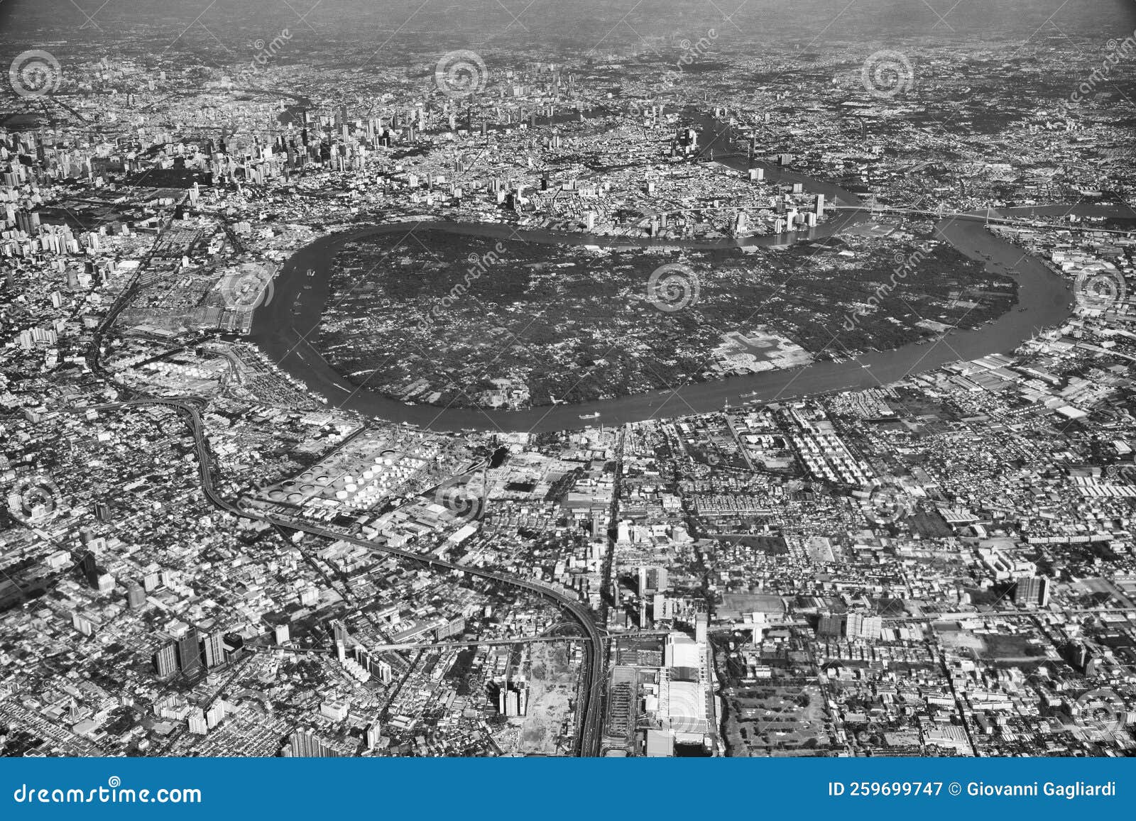 Aerial View of a Metropolitan City and the Main River Surrounding it ...