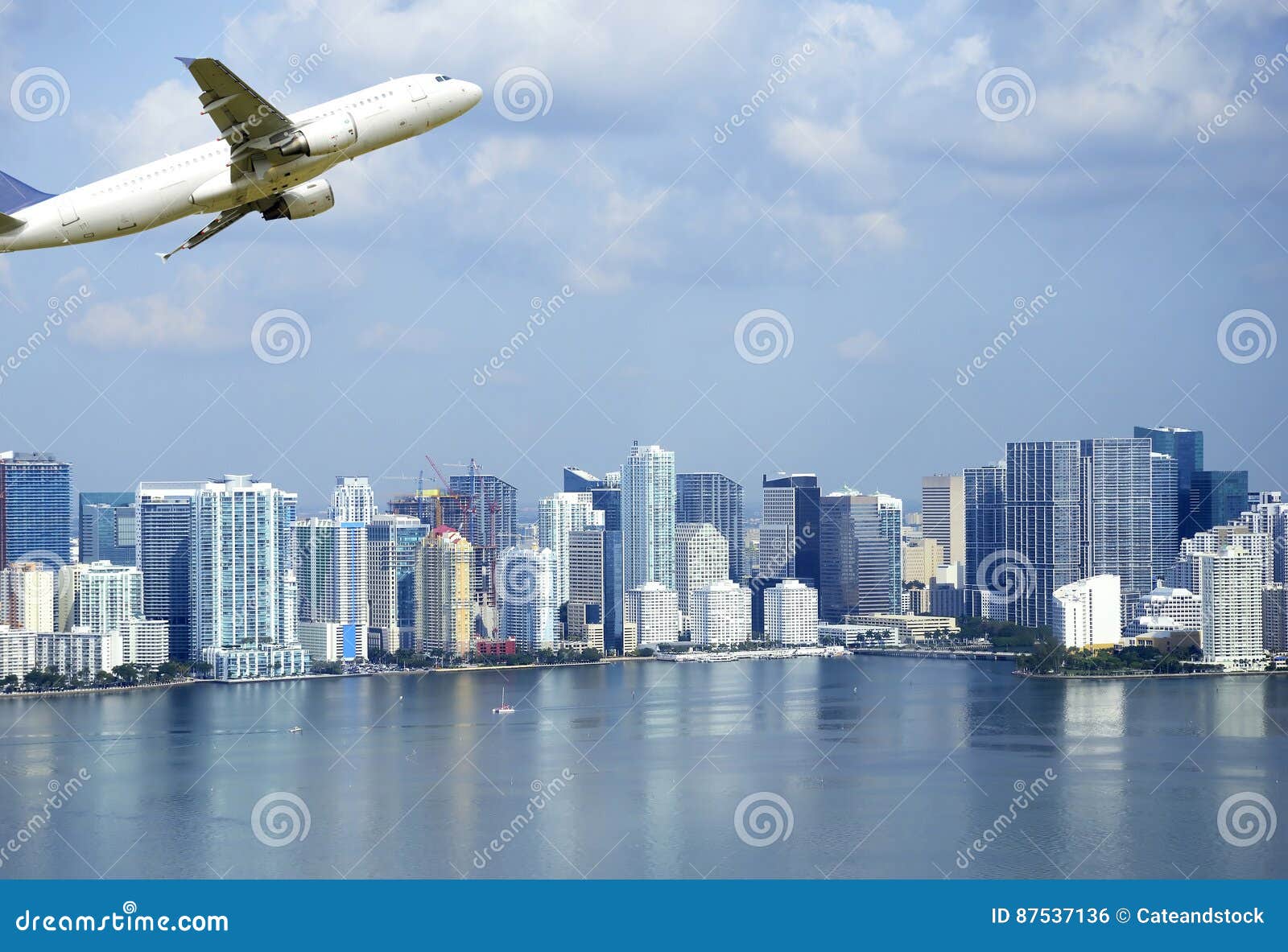 Airplane Flying Over Miami Skyscrapers Stock Photo - Image of freedom ...