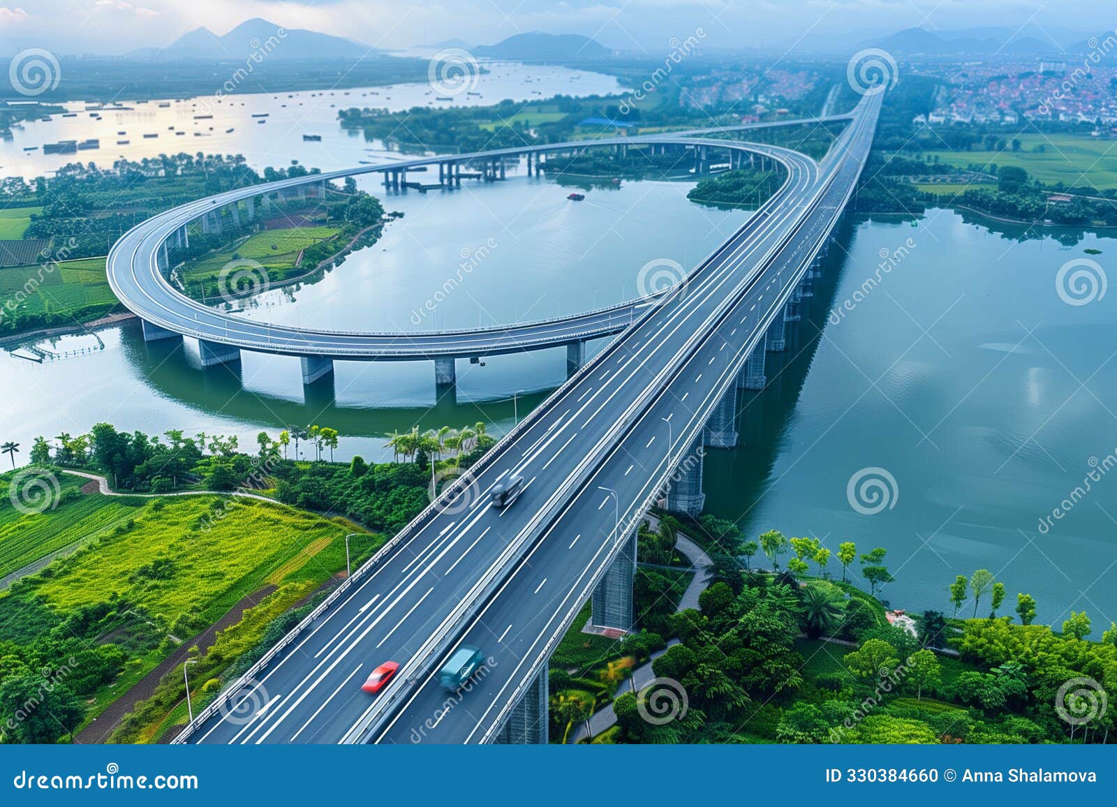 Aerial View of Modern Curved Highway Over River with Lush Greenery and ...