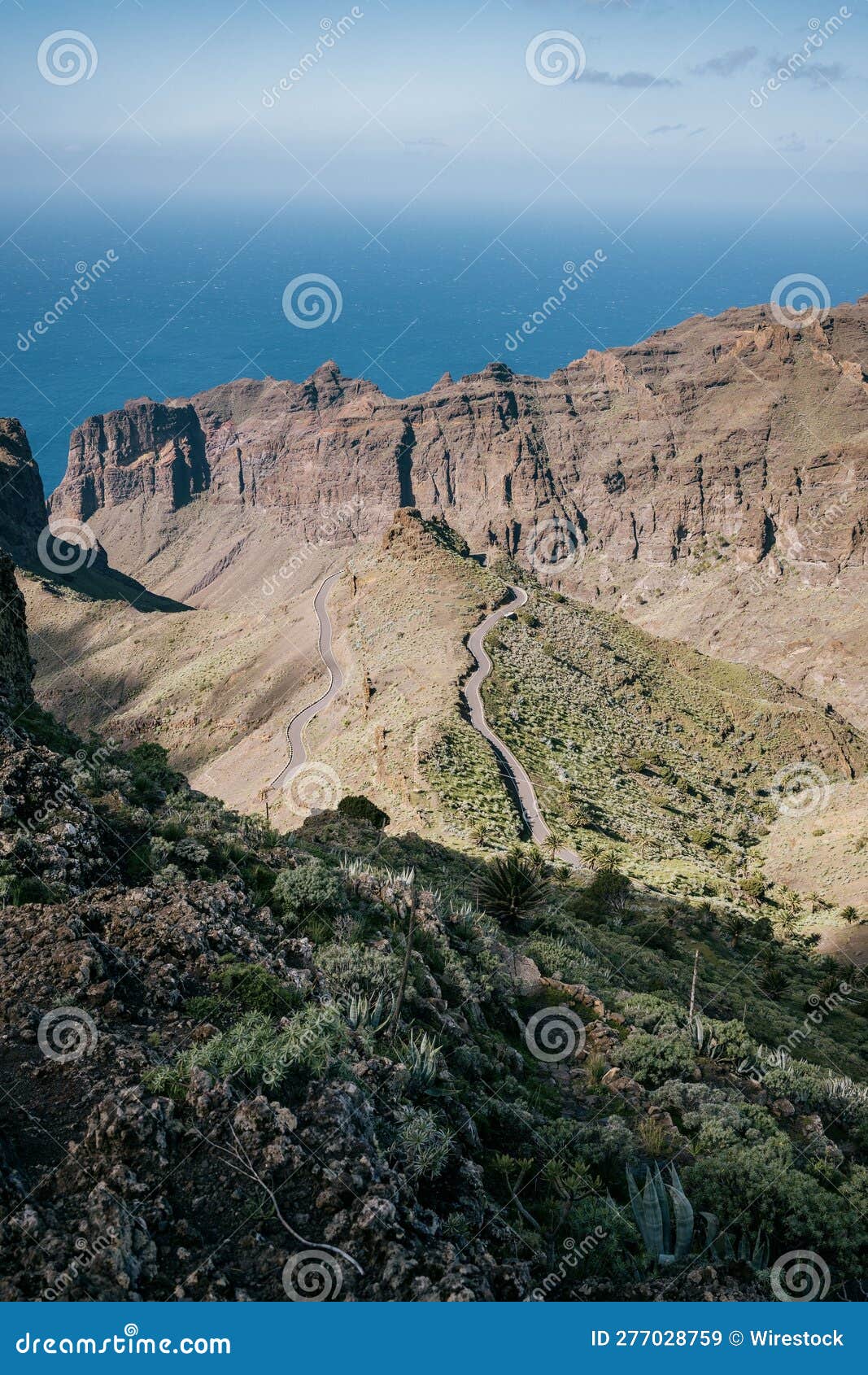 Aerial View of a Mountain Range with a Stunning View of the Ocean in ...