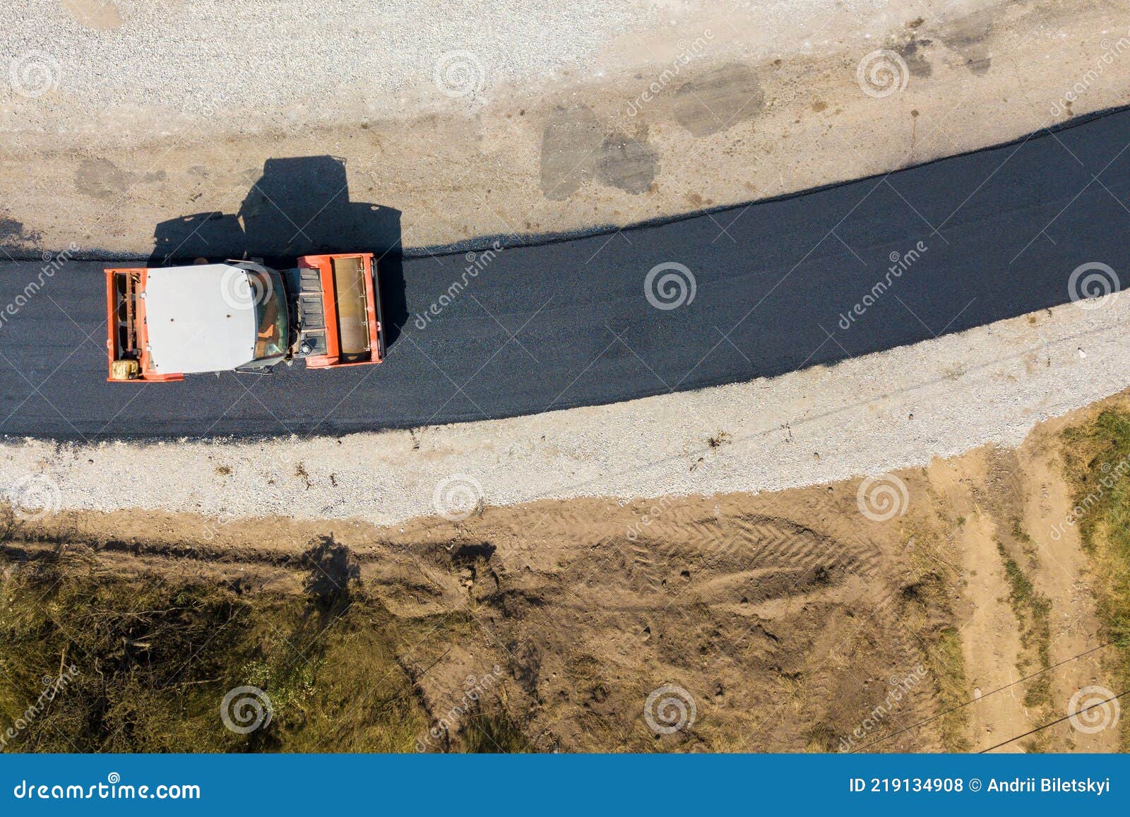 Aerial View of New Road Construction with Steam Roller Machine at Work ...
