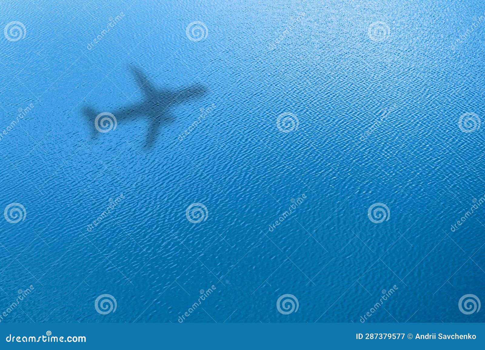 Aerial View of Ocean Waves with Airplane Shadow on the Water. Airplane ...