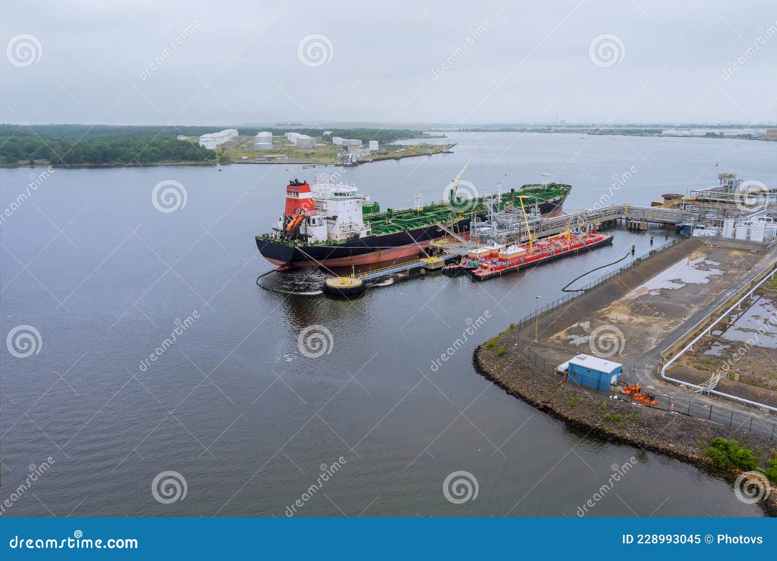 Aerial View of Oil Tanker Ship Moored at a Oil Storage Terminal Stock ... Aerial View of Oil Tanker Ship Moored at a Oil Storage Terminal Stock ...