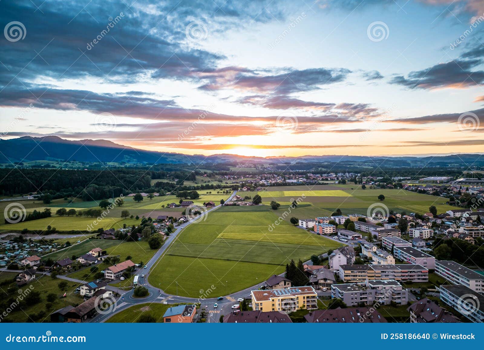 Aerial View Over a City and Landscape during Sunset Stock Photo - Image ...
