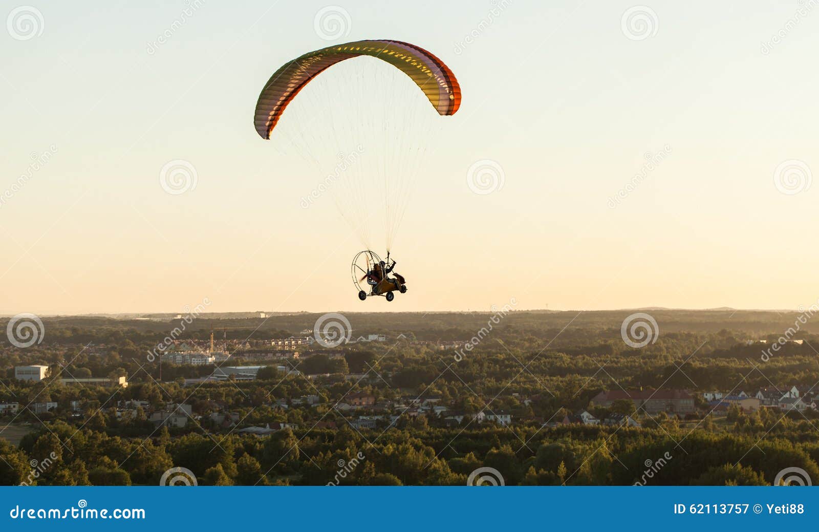 Aerial View of Paramotor Flying Over the City Stock Image - Image of ...
