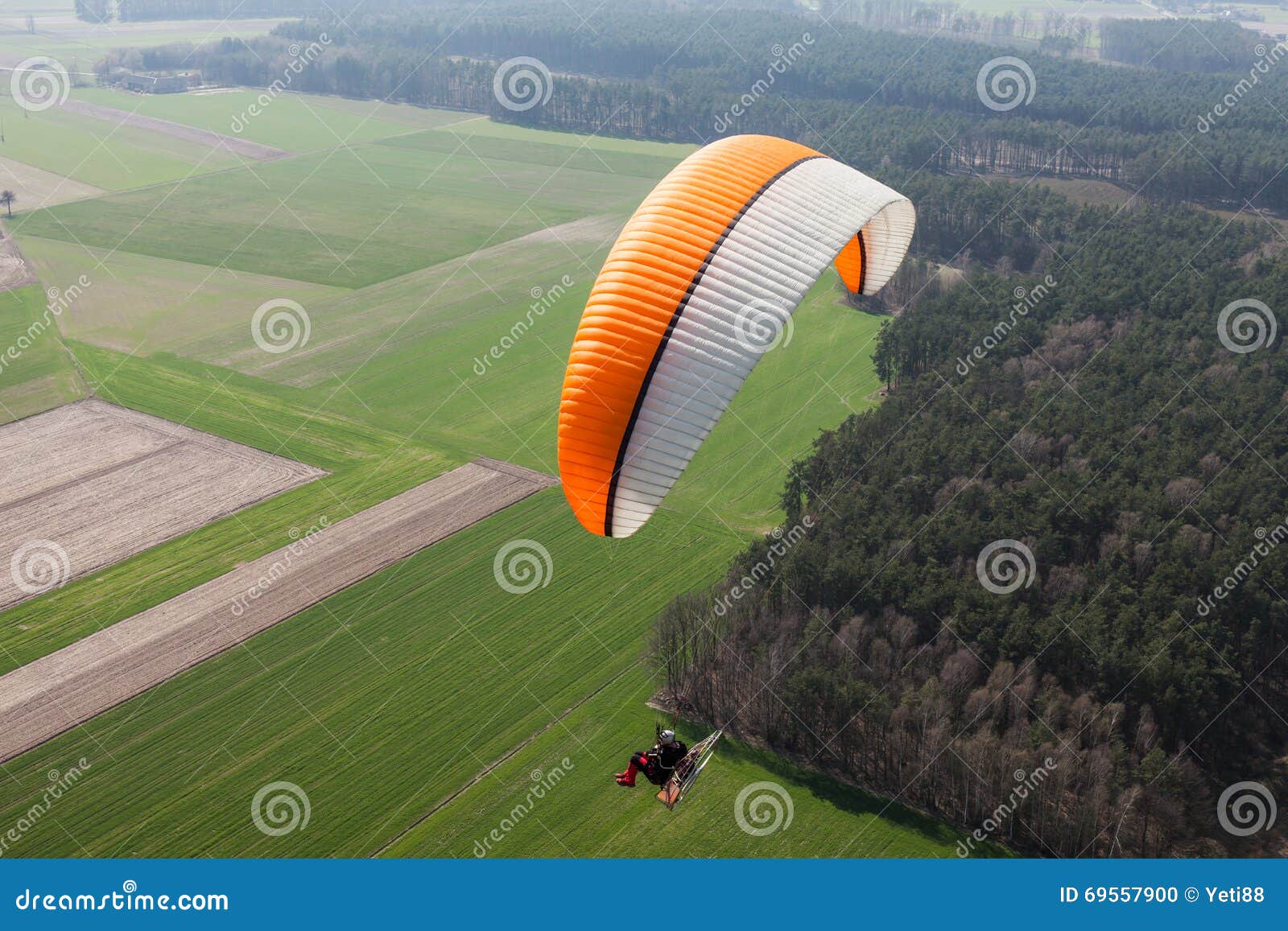Aerial View of Paramotor Flying Over the Fields I Stock Photo - Image ...