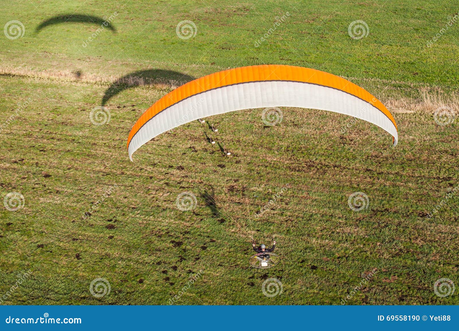 Aerial View of Paramotor Flying Over the Fields Stock Photo - Image of ...