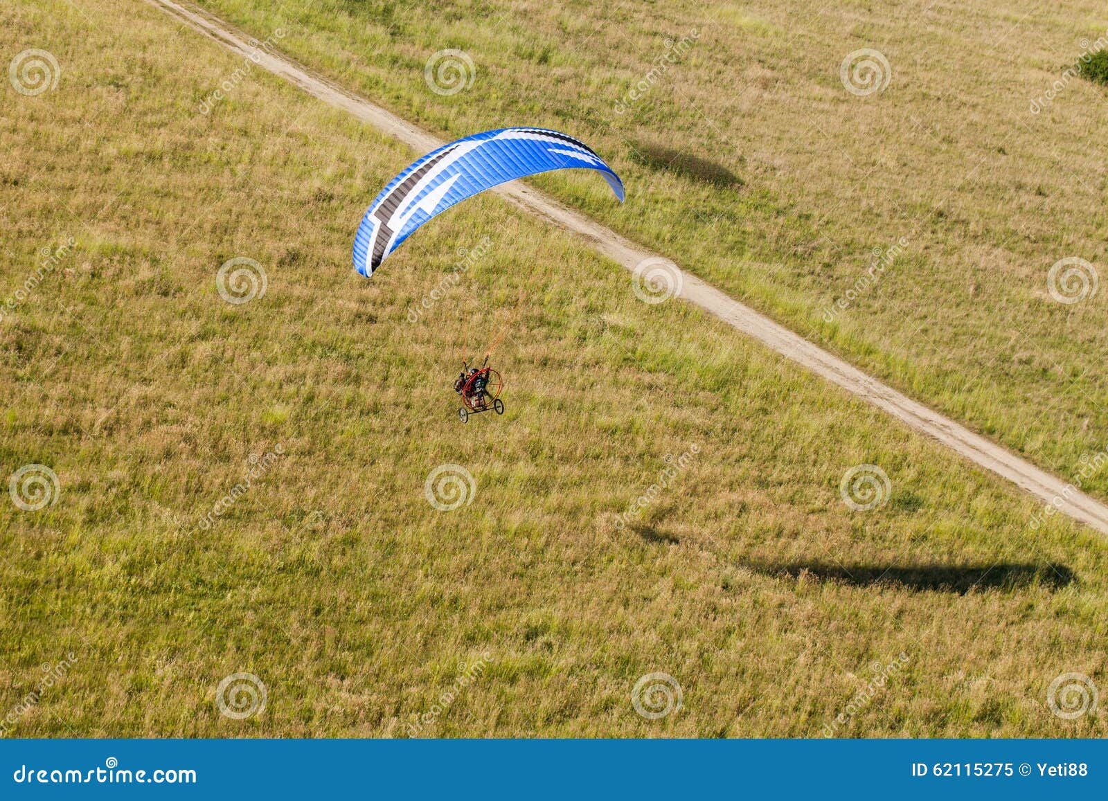 Aerial View of Paramotor Flying Over the Fields Stock Image - Image of ...
