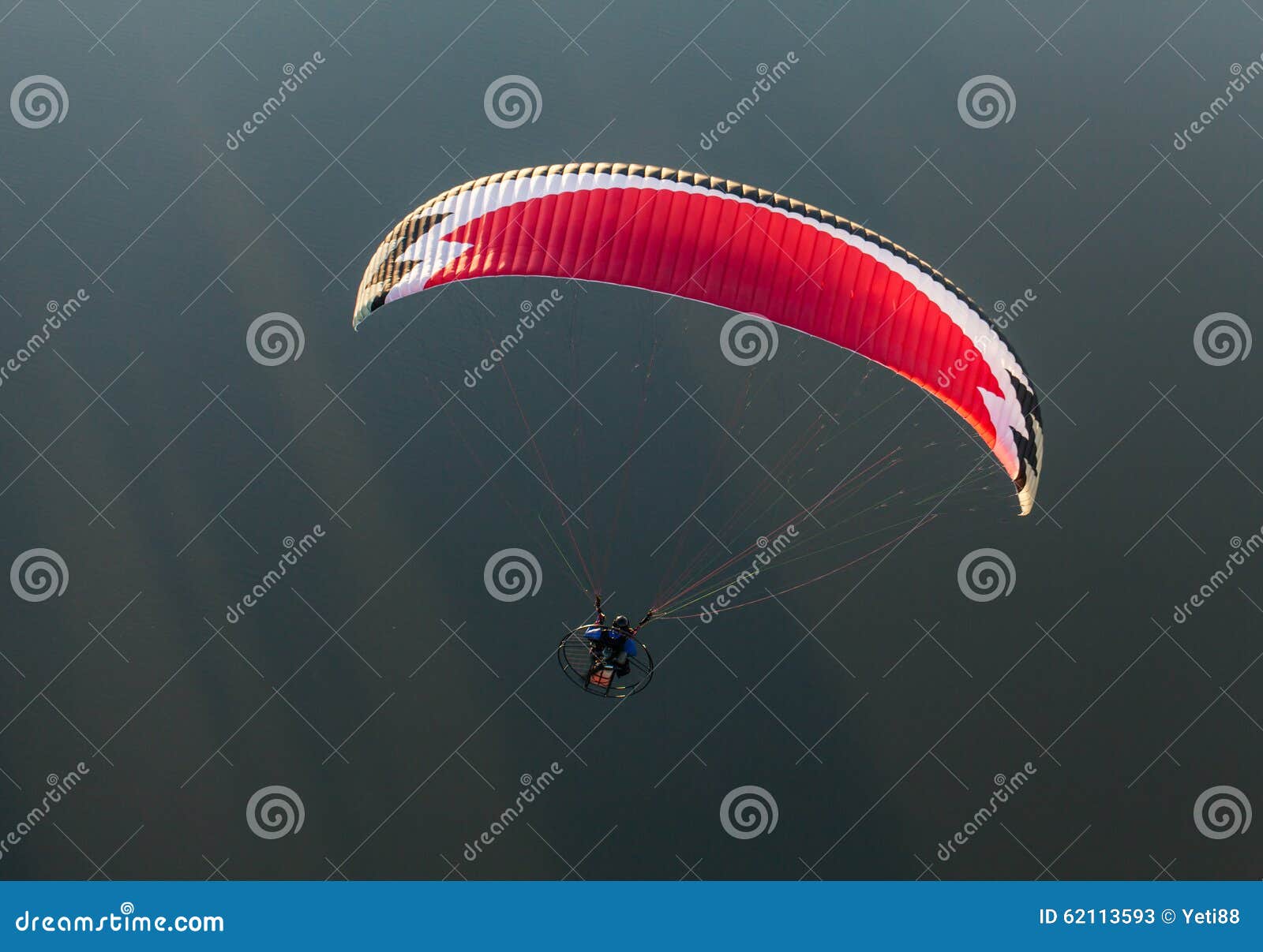 Aerial View of Paramotor Flying Over the River Stock Image - Image of ...