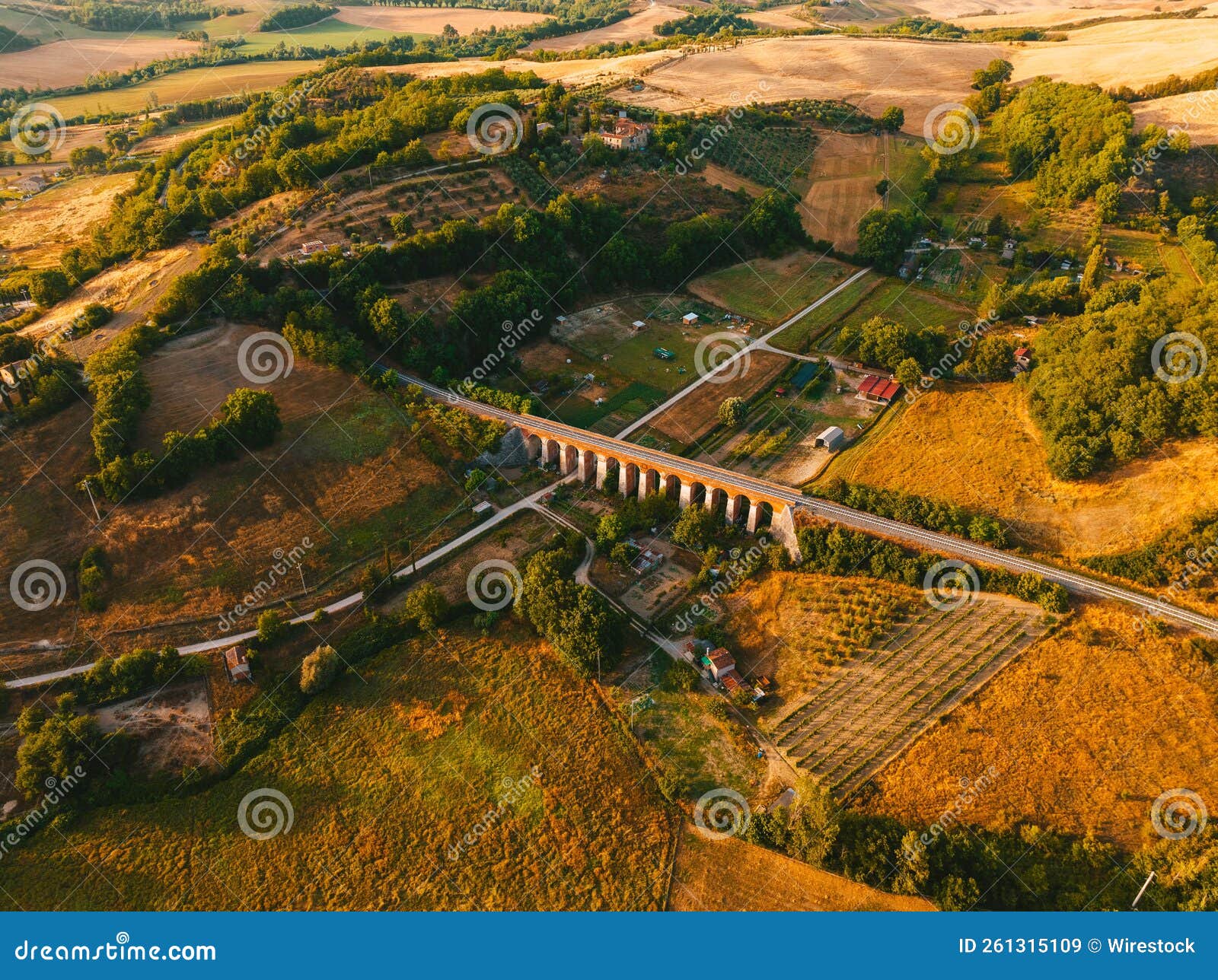 Aerial View of a Railway Viaduct Stretching through Lush Green Village ... Aerial View of a Railway Viaduct Stretching through Lush Green Village ...