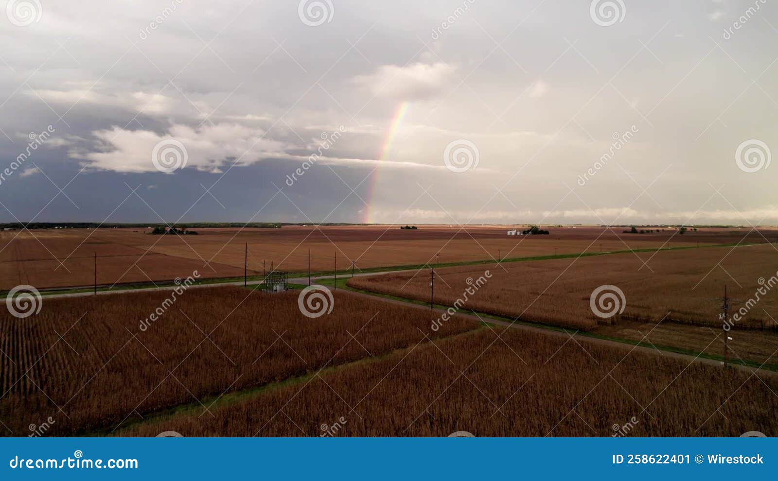 Aerial View of a Rainbow Over a Field Stock Video - Video of field ...