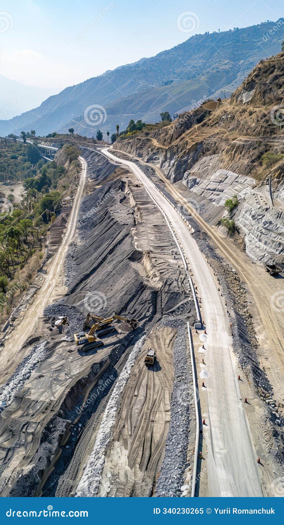 Aerial View of Retaining Wall Construction Progress Along Mountainous ...