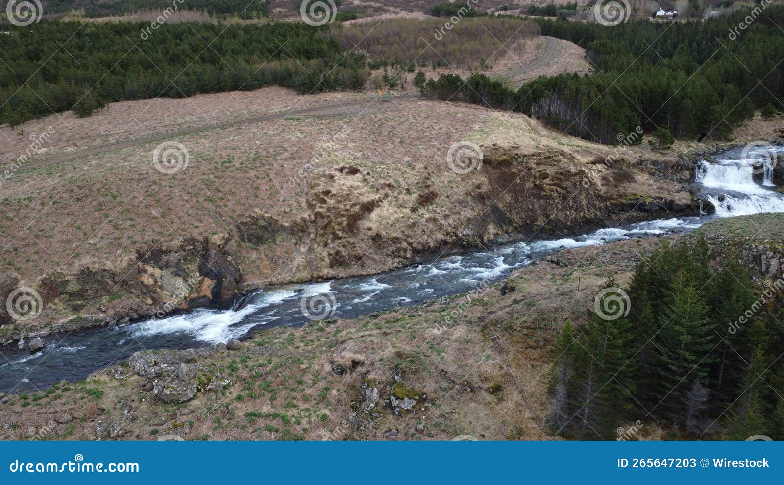 Aerial View of a River Flowing Downstream in the Middle of Cliffs Stock ...
