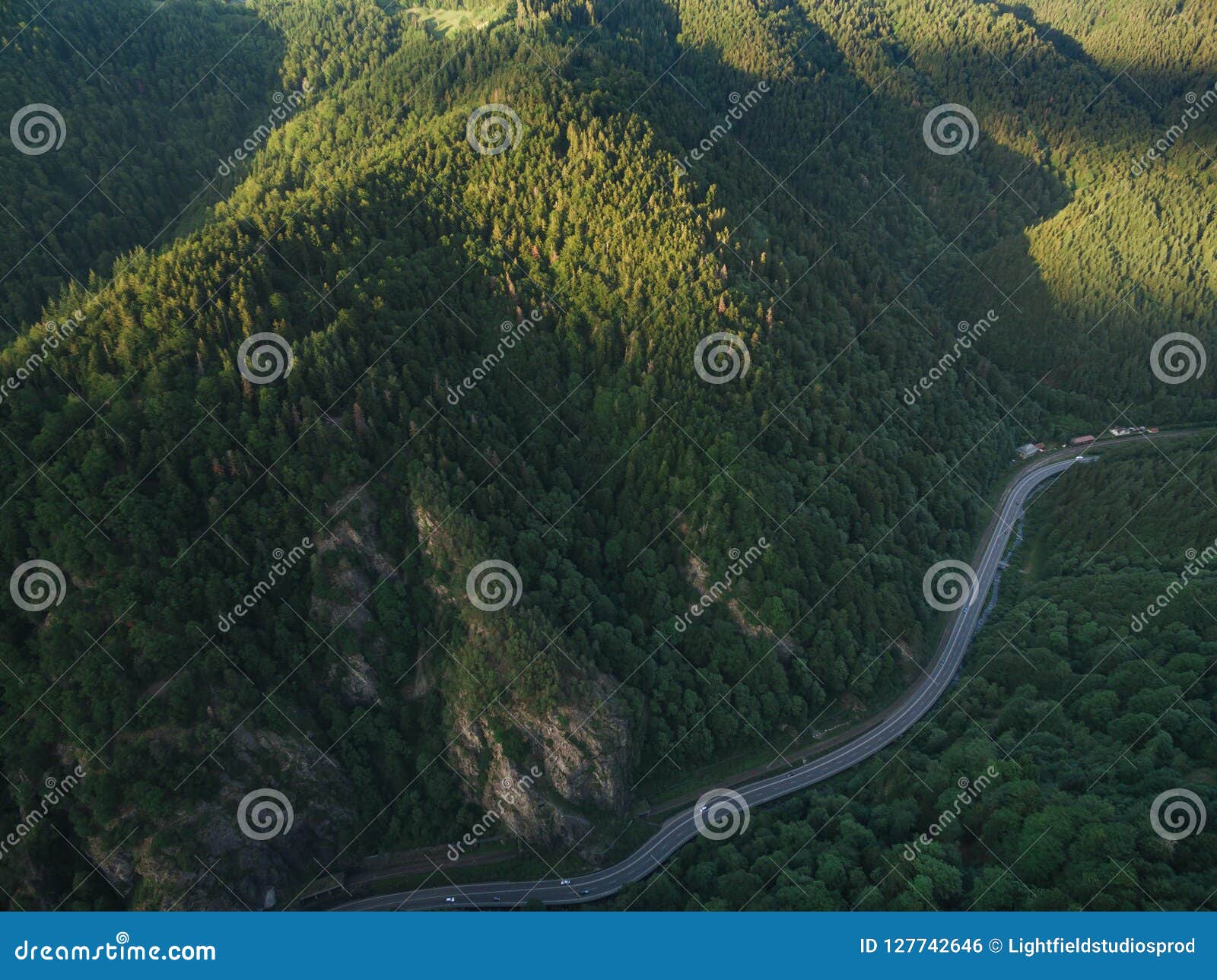 Aerial View of Road in Beautiful Mountain Forest on Sunset Stock Photo ...