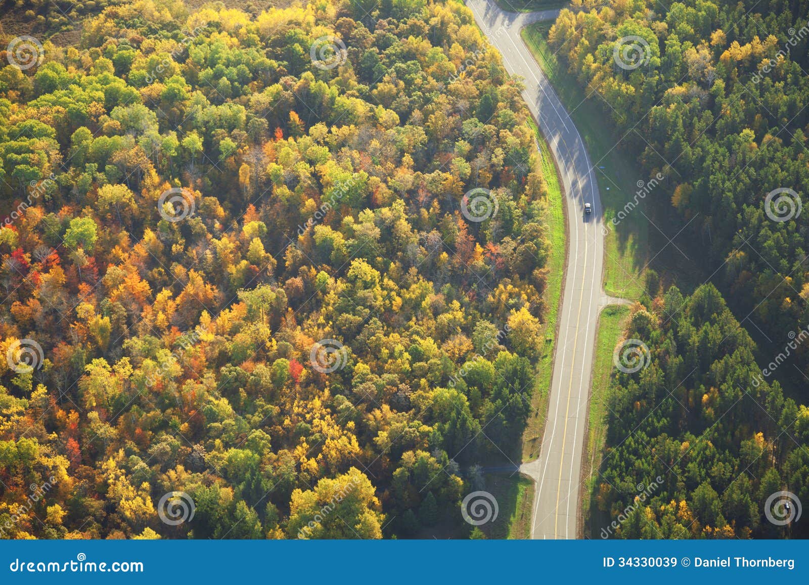Aerial View of Road Curving through Woods in Fall Color Stock Image ...