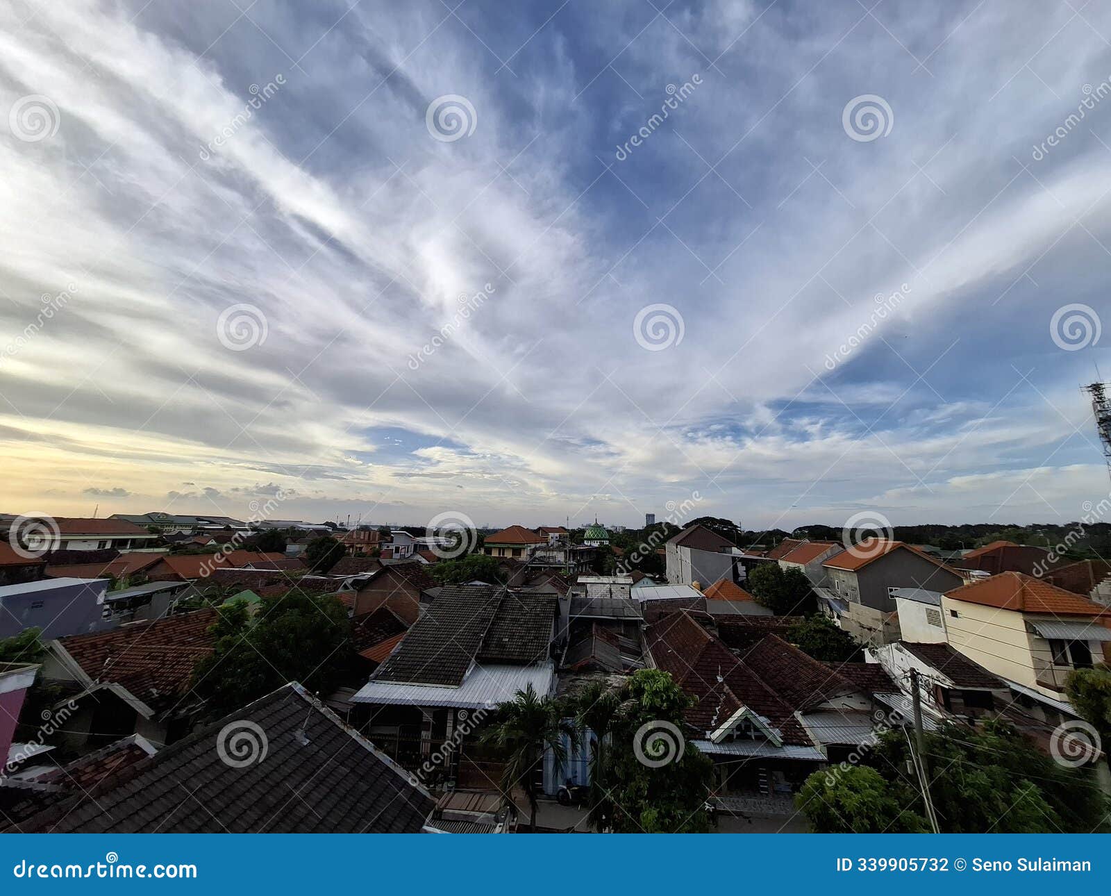 Aerial View of Rooftops with Cloudy Sky Photo Stock Photo - Image of ...