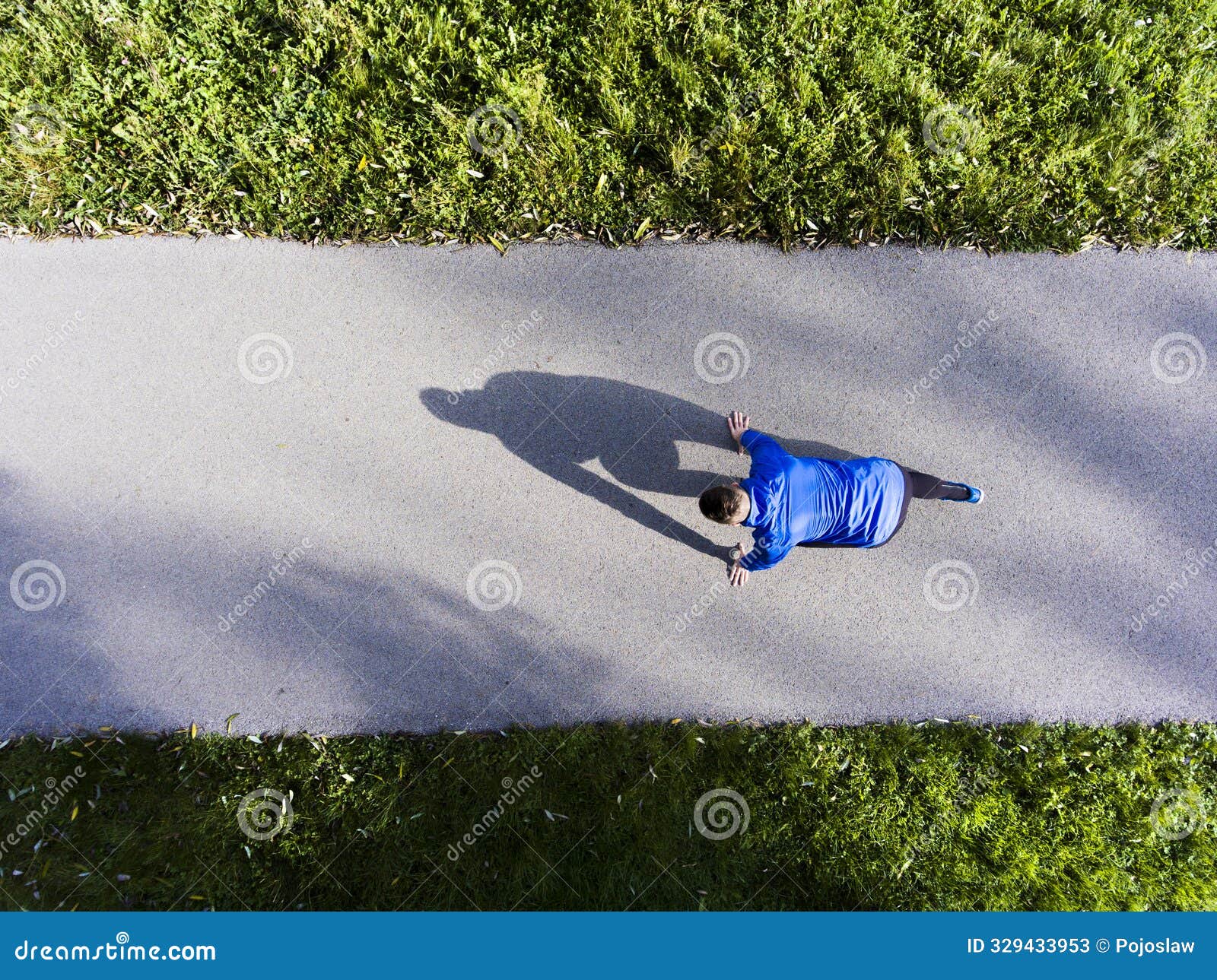Aerial View of a Runner in Starting Position. Man Running through the ...