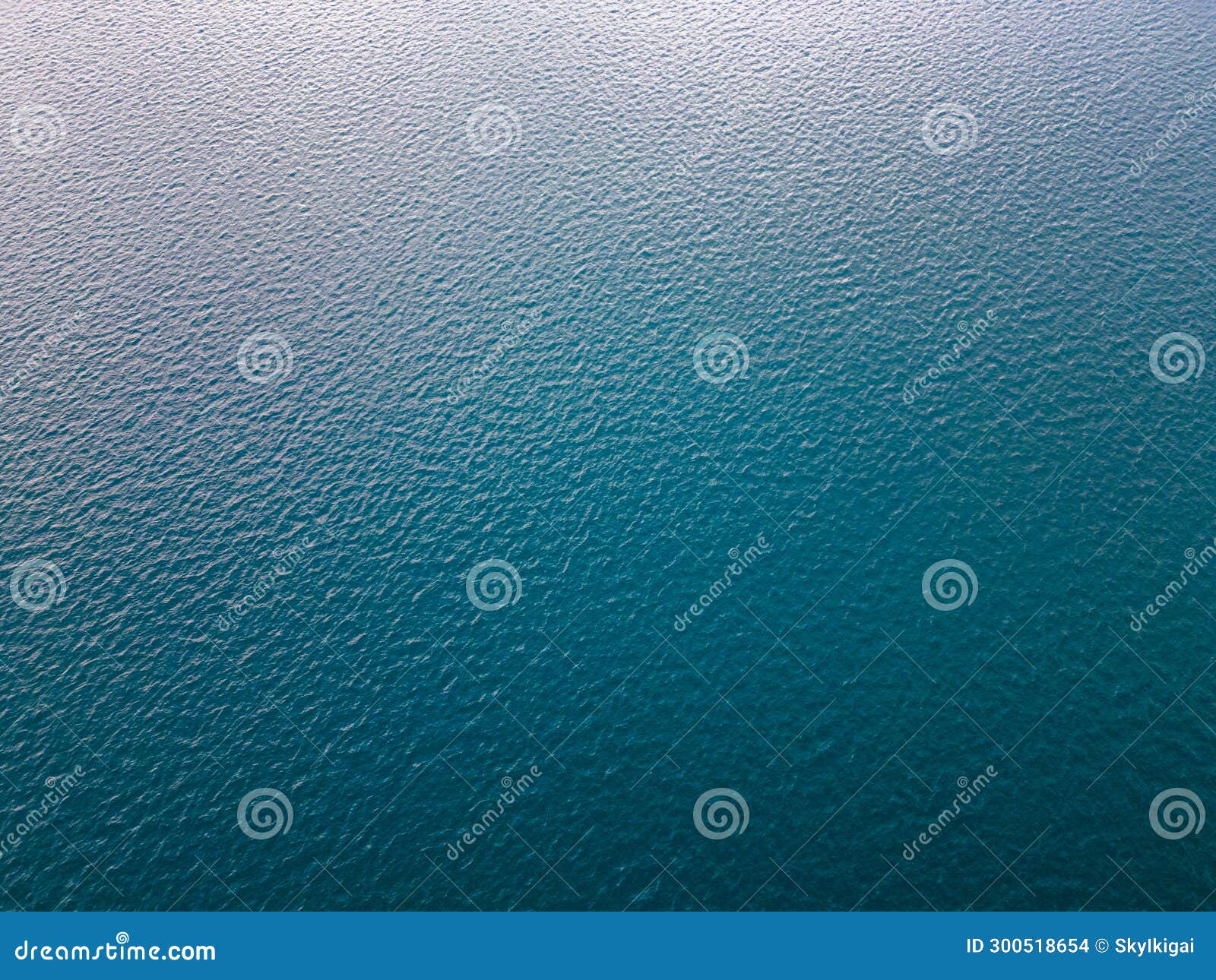 Aerial View of the Sea Surface Pattern Reflecting the Sky Background ...