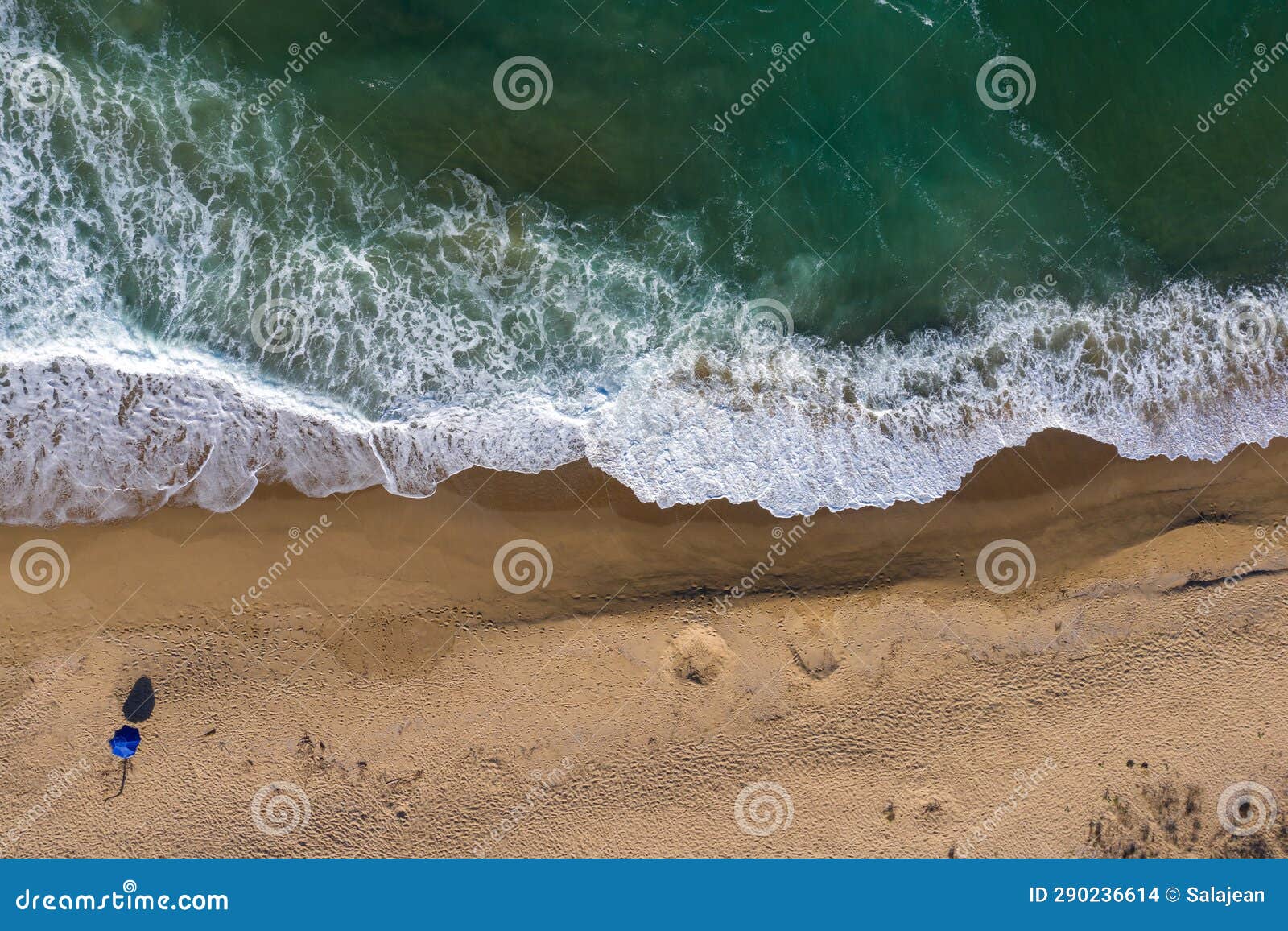 Aerial View of Secluded Beach with a Beach Umbrella Stock Photo - Image ...