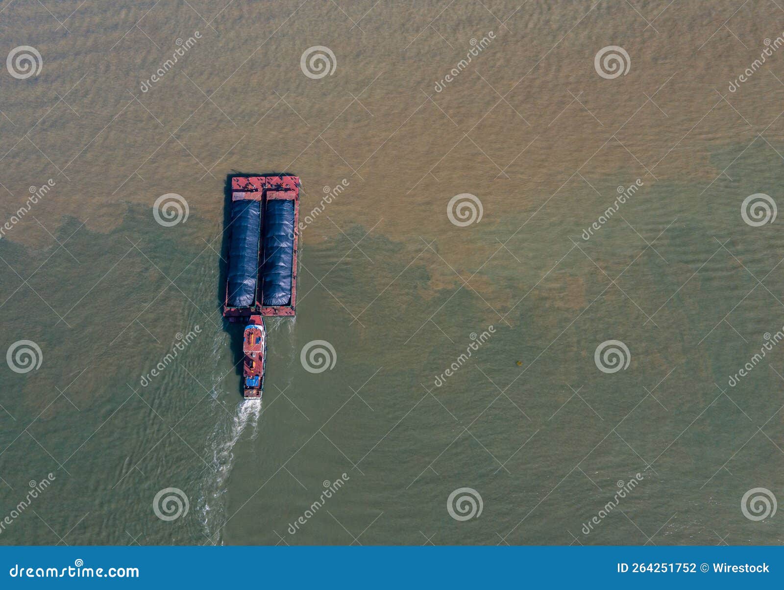 Aerial View of a Ship by Garbage Barrel in the Shallow Water Editorial ...