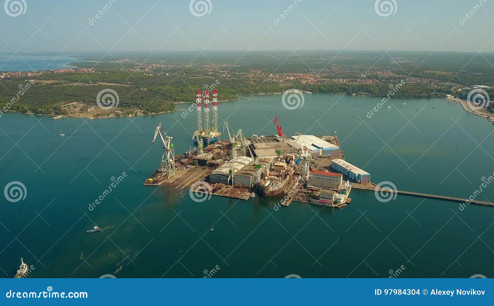 Aerial View of a Ship and an Oil Rig Under Construction at the Shipyard ...