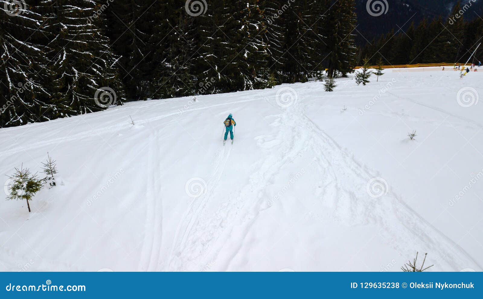 Aerial View of the Skier Who Descends the Mountainside Stock Photo ...