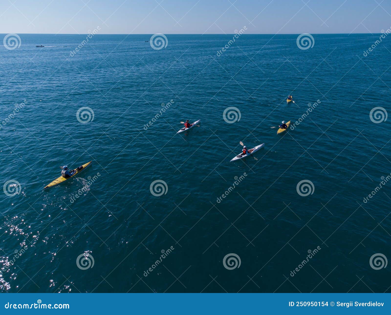 Aerial View of a Small Group of People Sea Kayaking Stock Photo - Image ...