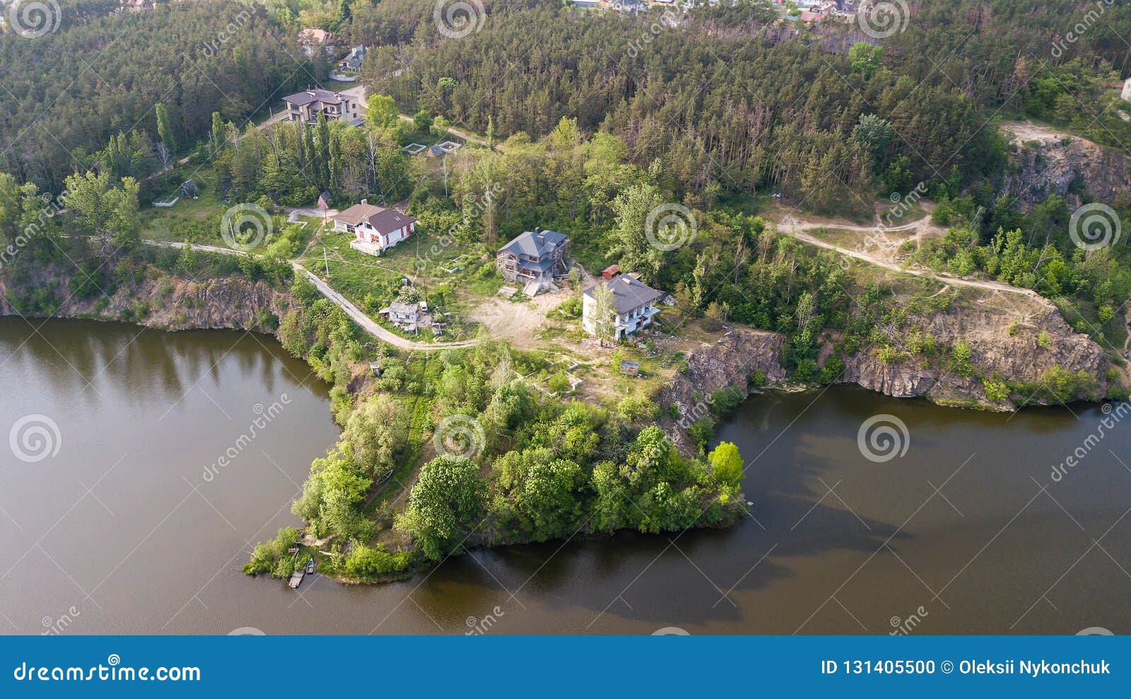 Aerial View of a Small River with Trees and Houses on the Shore Stock ...
