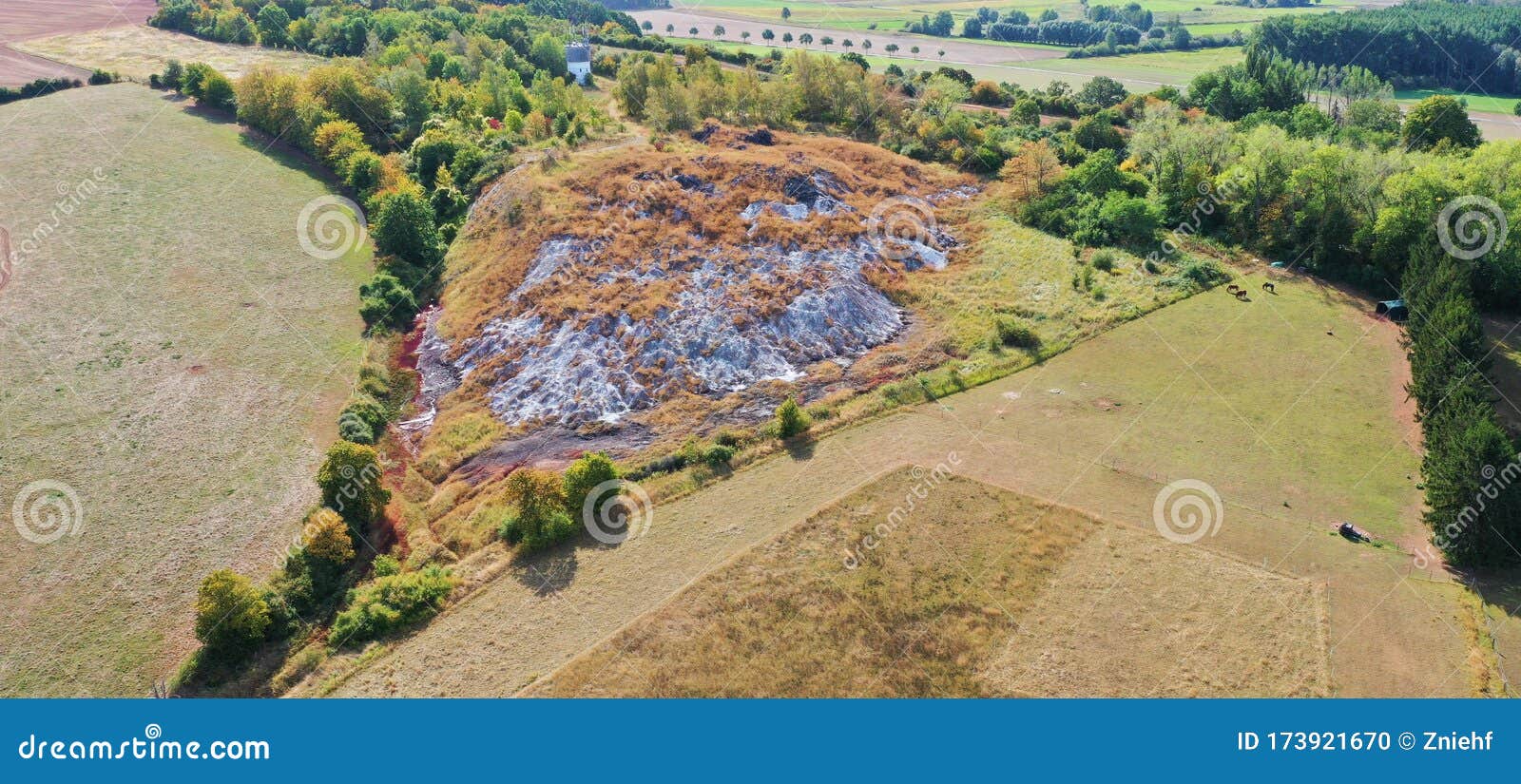 Aerial View of the Tailings Pile of an Ore Quarry, from Which Red ...