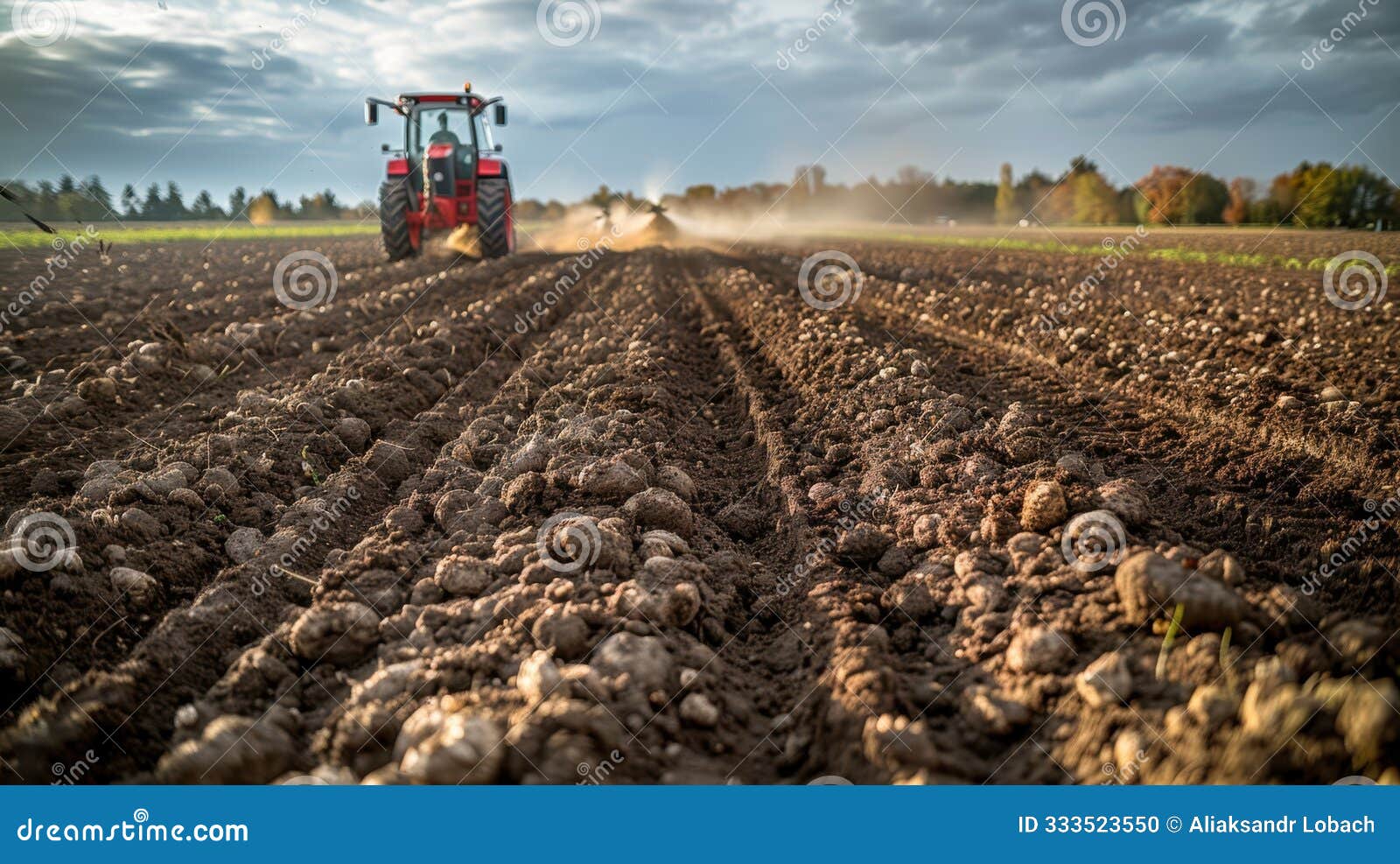 An Aerial View of a Tractor Tilling a Field in the Spring. Spring Field ...