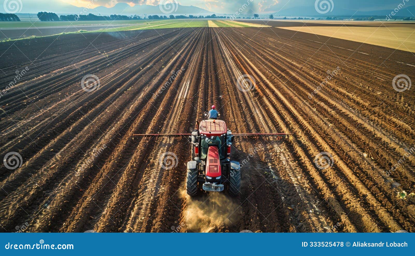 An Aerial View of a Tractor Tilling a Field in the Spring. Spring Field ...