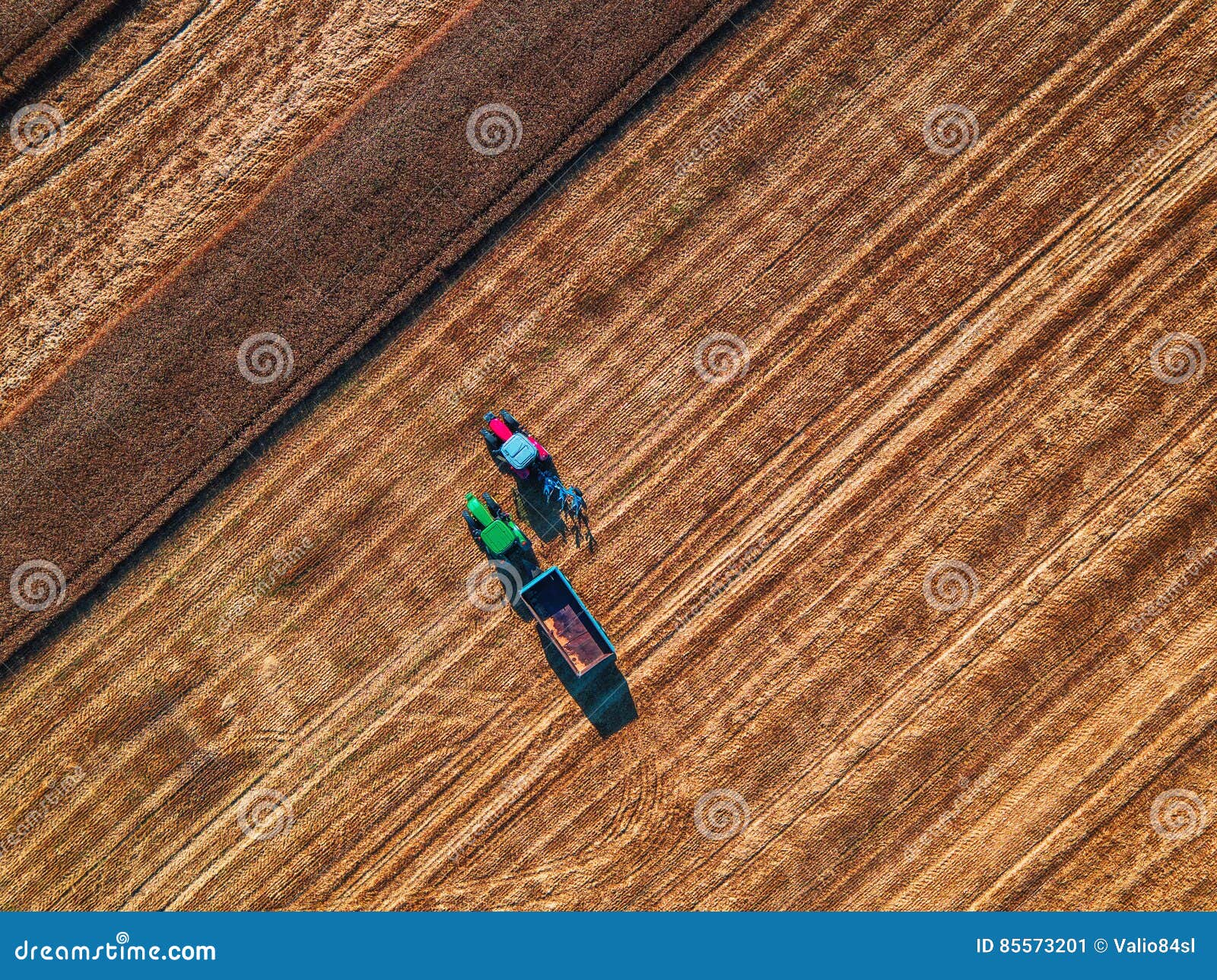 Aerial View of 2 Tractors Working on the Harvest Field Stock Image ...