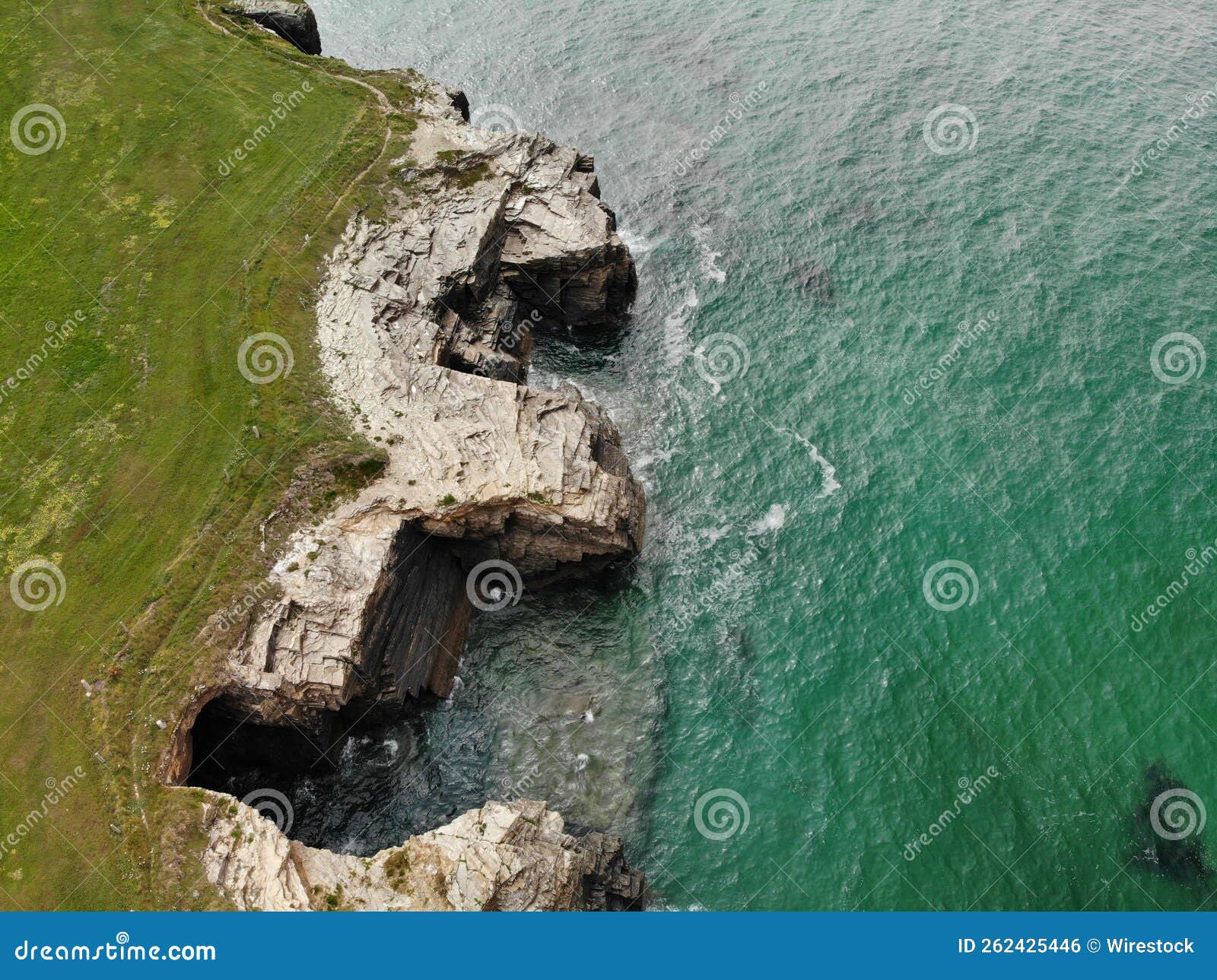 Aerial View of a Turquoise Ocean with Cliff on the Side Stock Photo ...