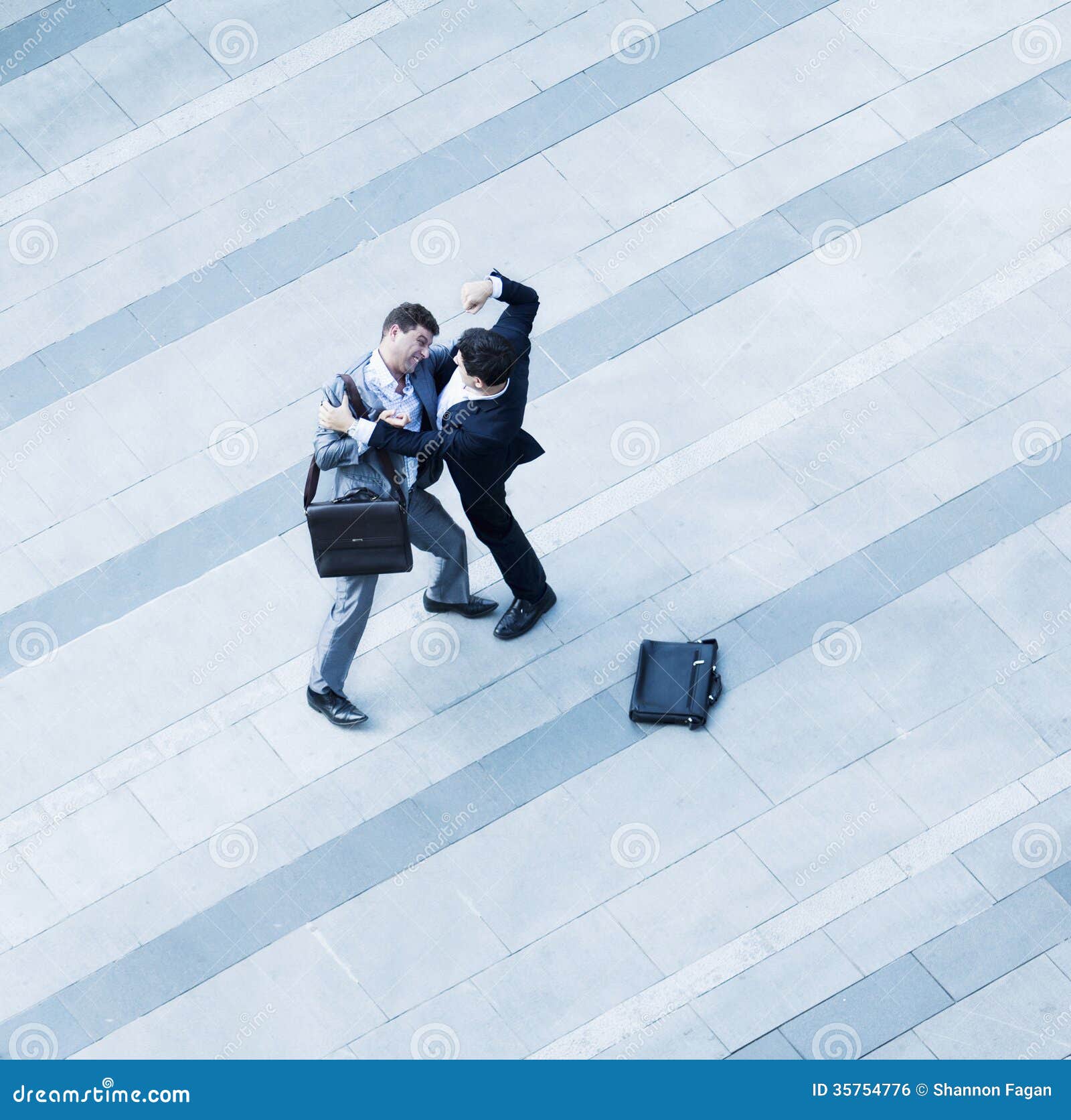 Aerial View of Two Businessmen Fighting Each Other of the Sidewalk ...