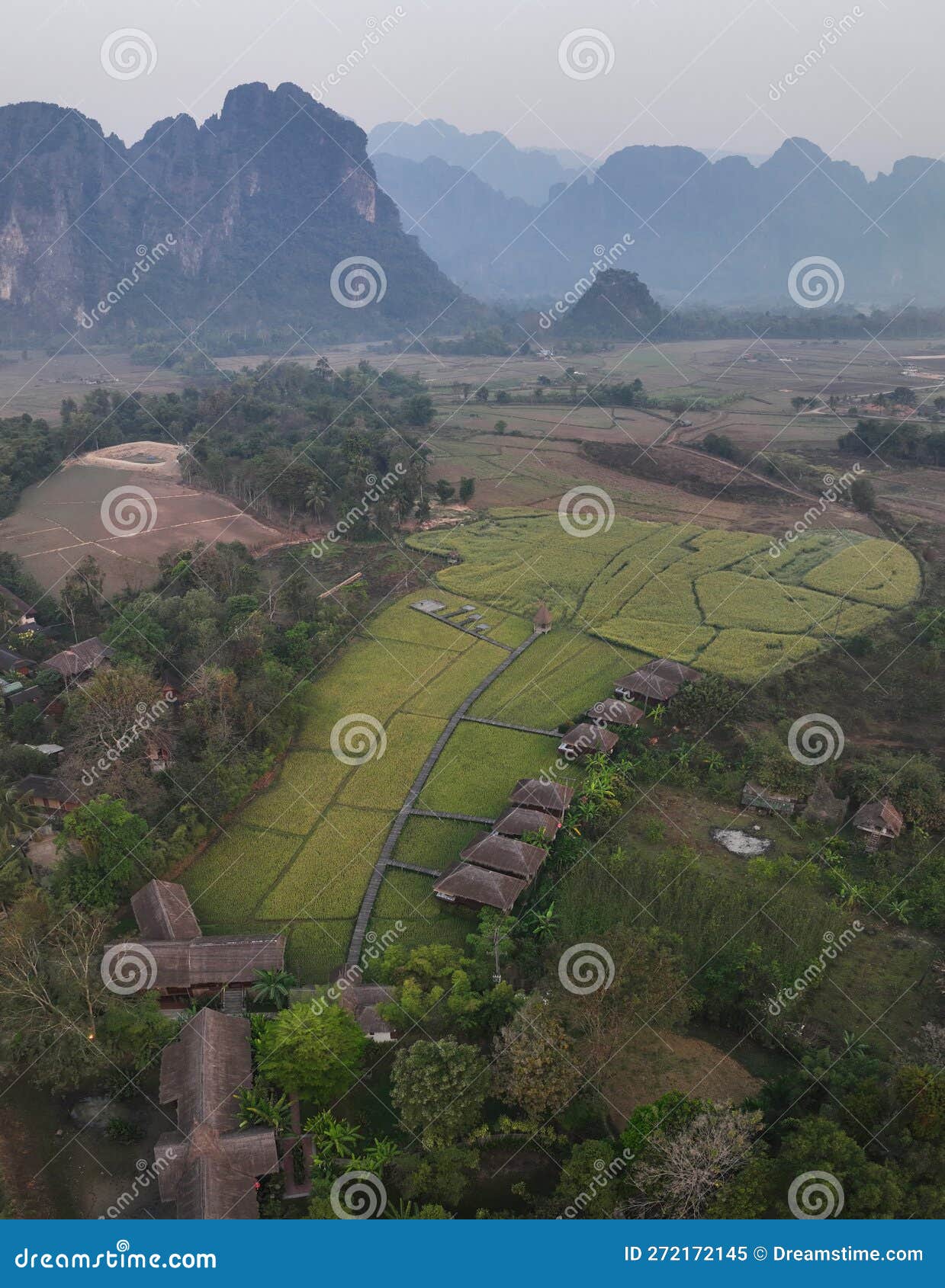 Aerial View of Vang Vieng and Rice Fields at Sunset, Laos Stock Image ...