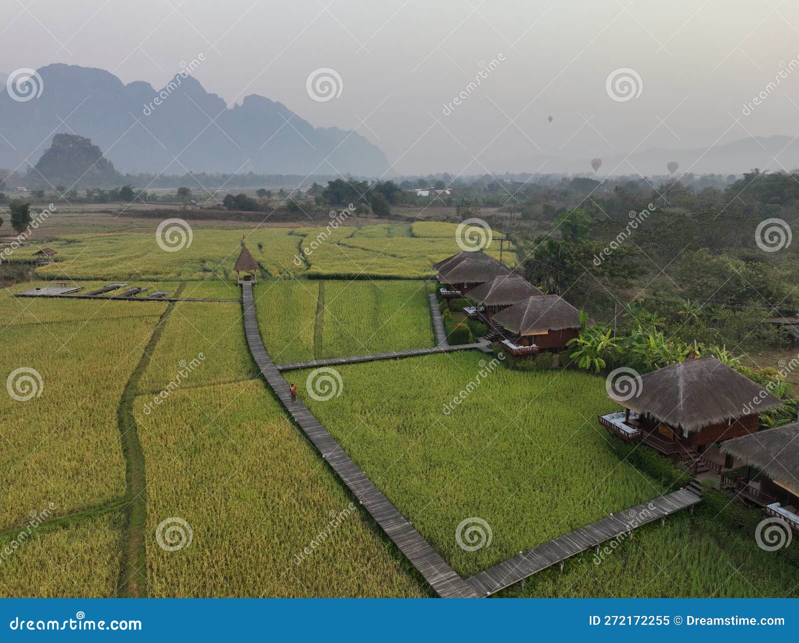 Aerial View of Vang Vieng and Rice Fields at Sunset, Laos Stock Image ...