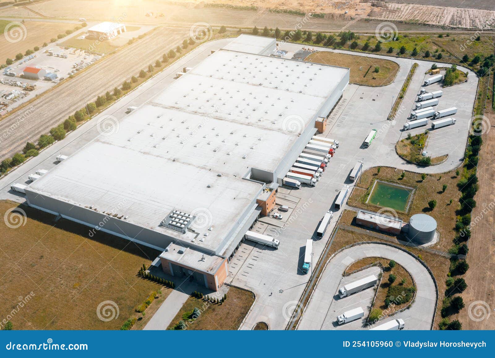 Unloading Trucks At A Modern Warehouse Complex Royalty-Free Stock Photo ...