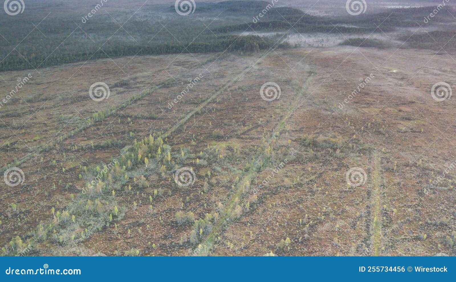 Aerial View of a Wide Dirt Field Stock Photo - Image of building, city ...