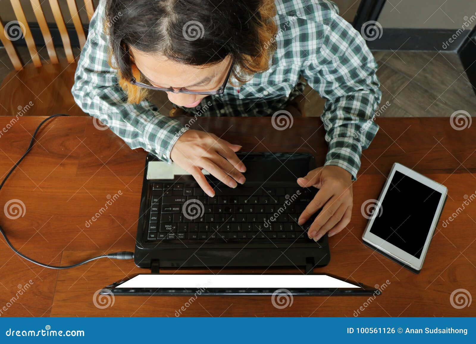 Aerial View of Worker Using Laptop for His Work in the Desk at Office ...