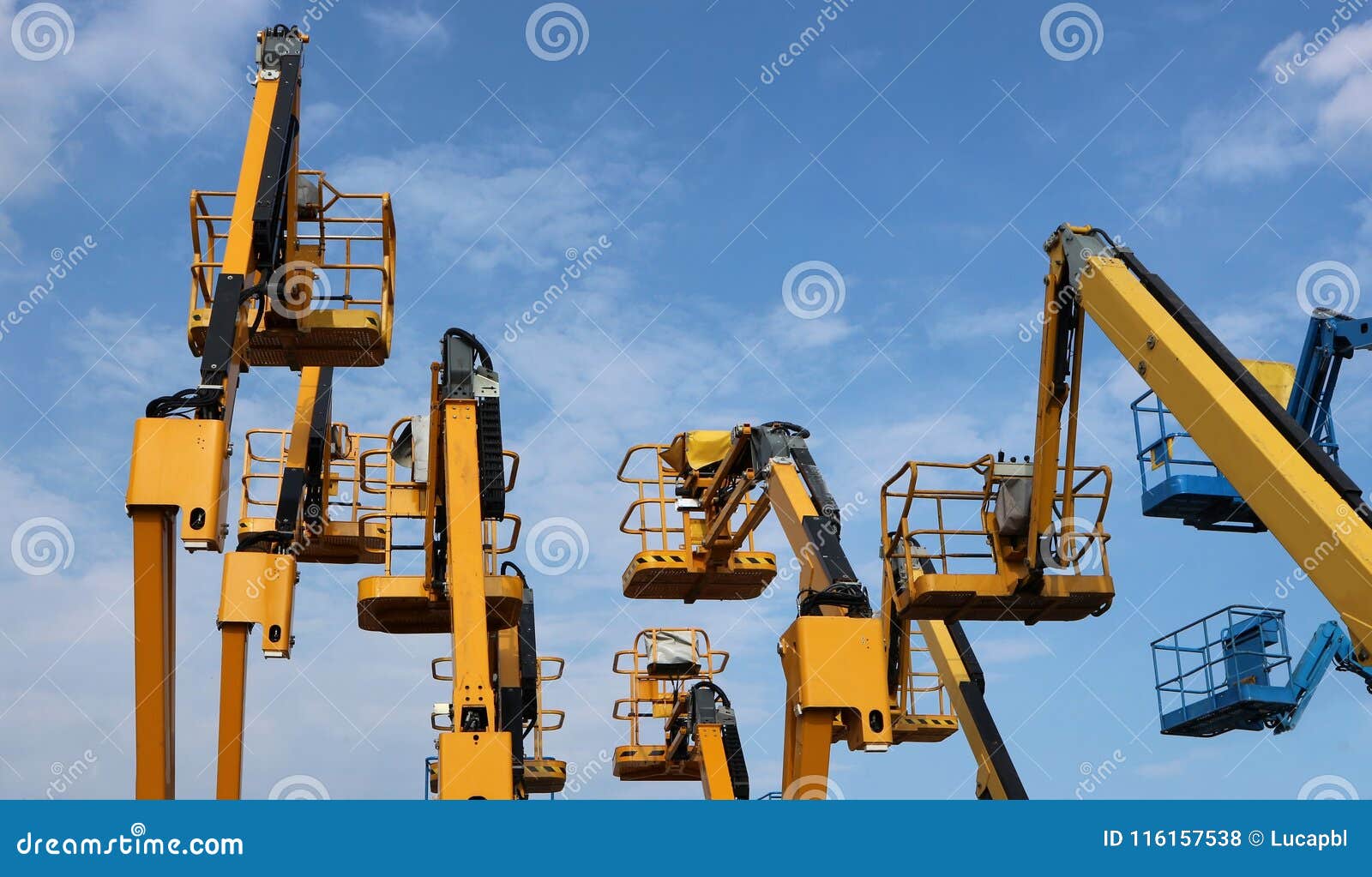 Aerial Work Platform of Cherry Pickers on Blue Cloudy Sky Background ...